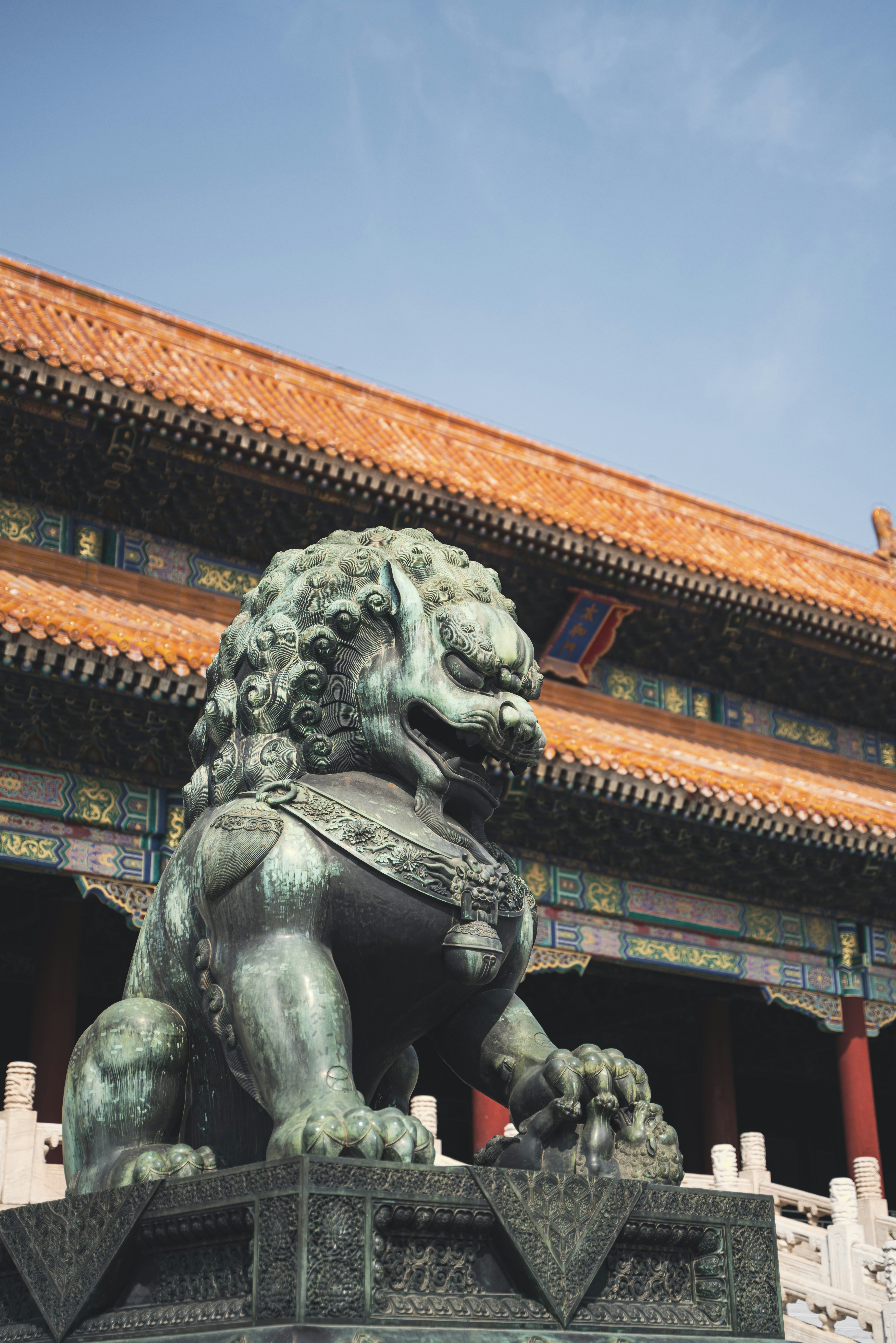 Guardian in Jade: A ceremonial lion watches over the temple roof