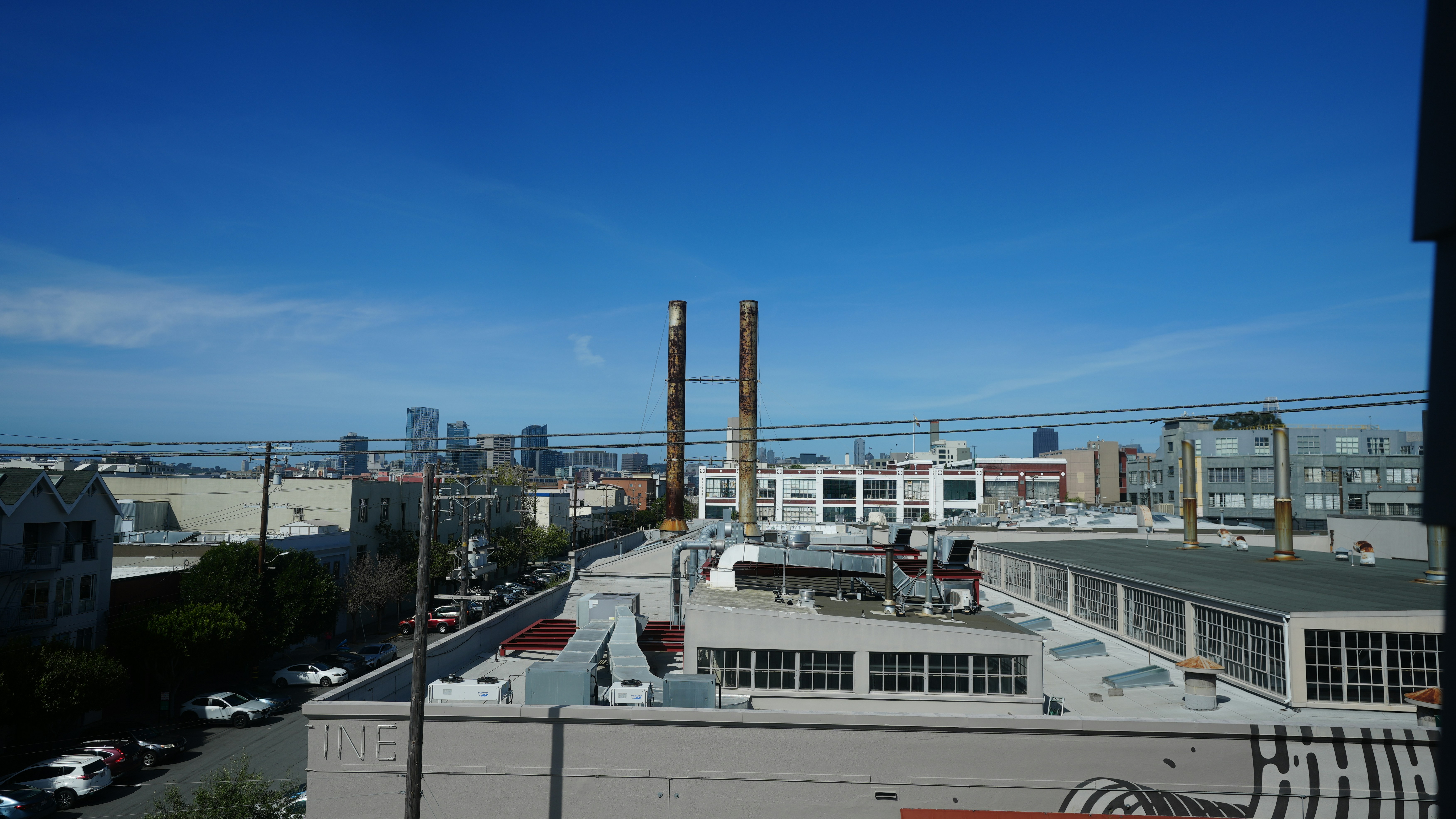 Rooftop Terrace Overlooking a Distant Skyline