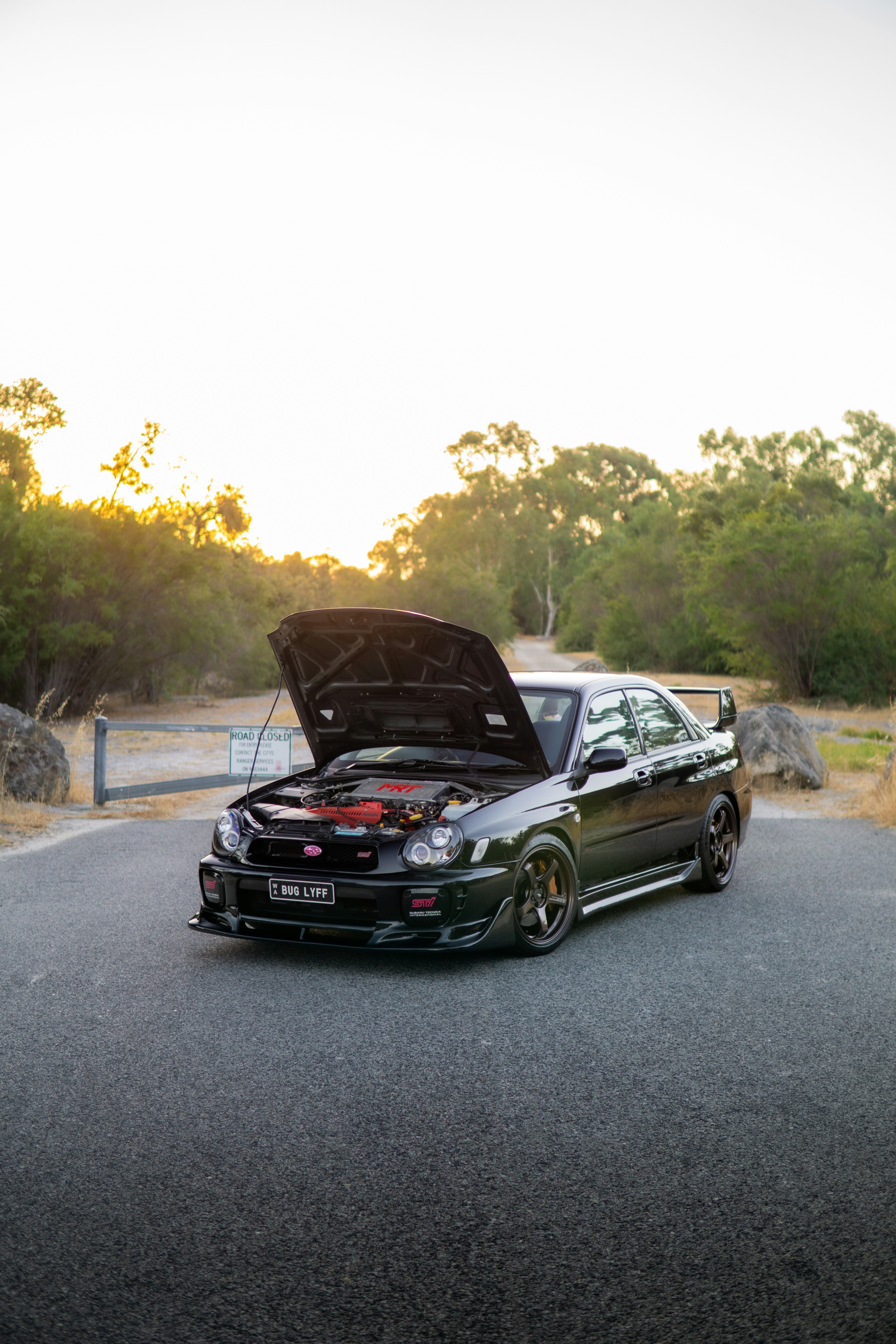 Under Hood at Golden Hour: A Stance-Stitched Subaru