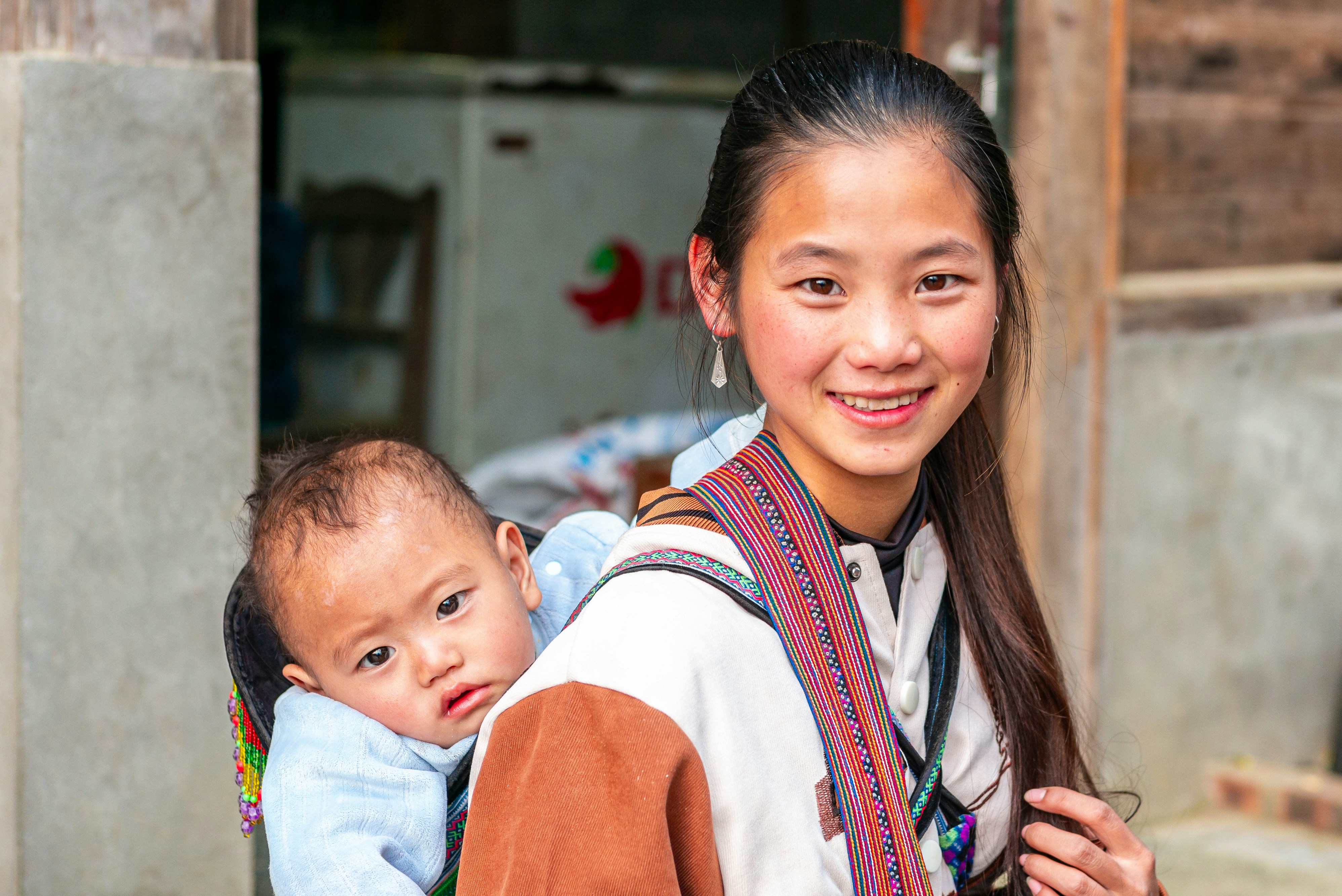 Mother with Child: A Warm Moment in a Rural Setting