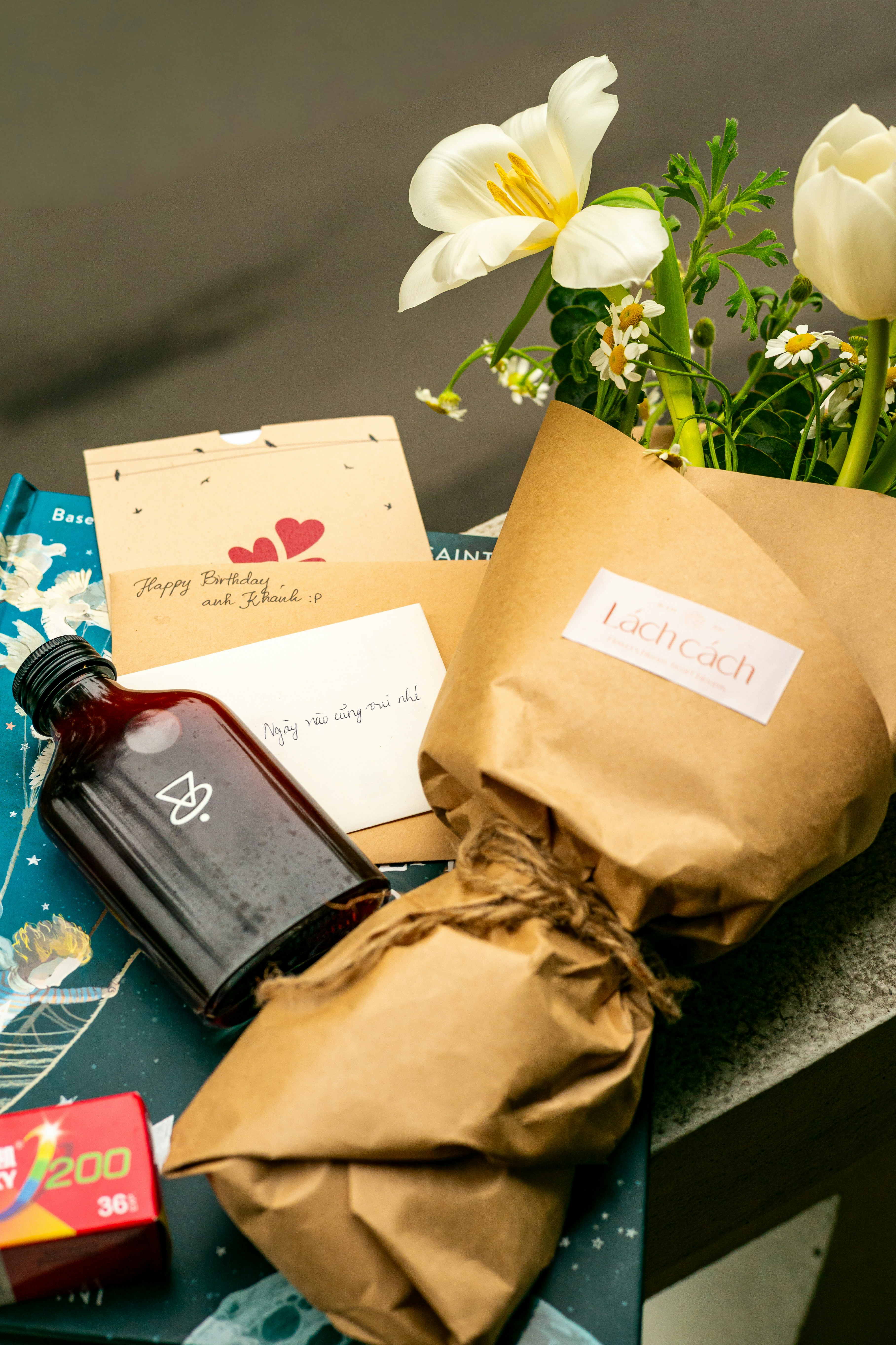 Bouquet of Care: A Gift Wrapped in Brown Paper and White Tulips
