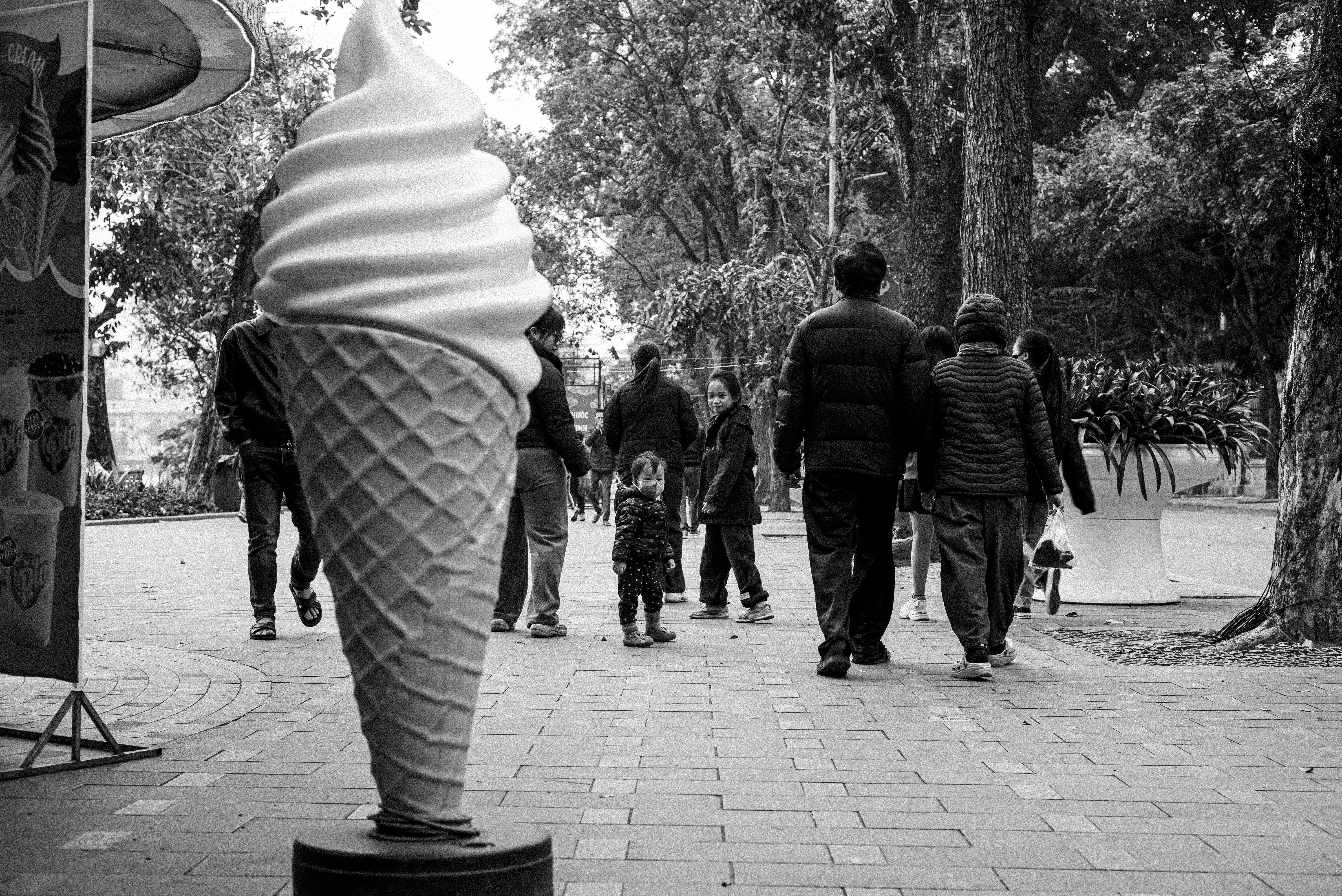 Ice Cream Colonnade: A Quiet Moment Amid Strolls