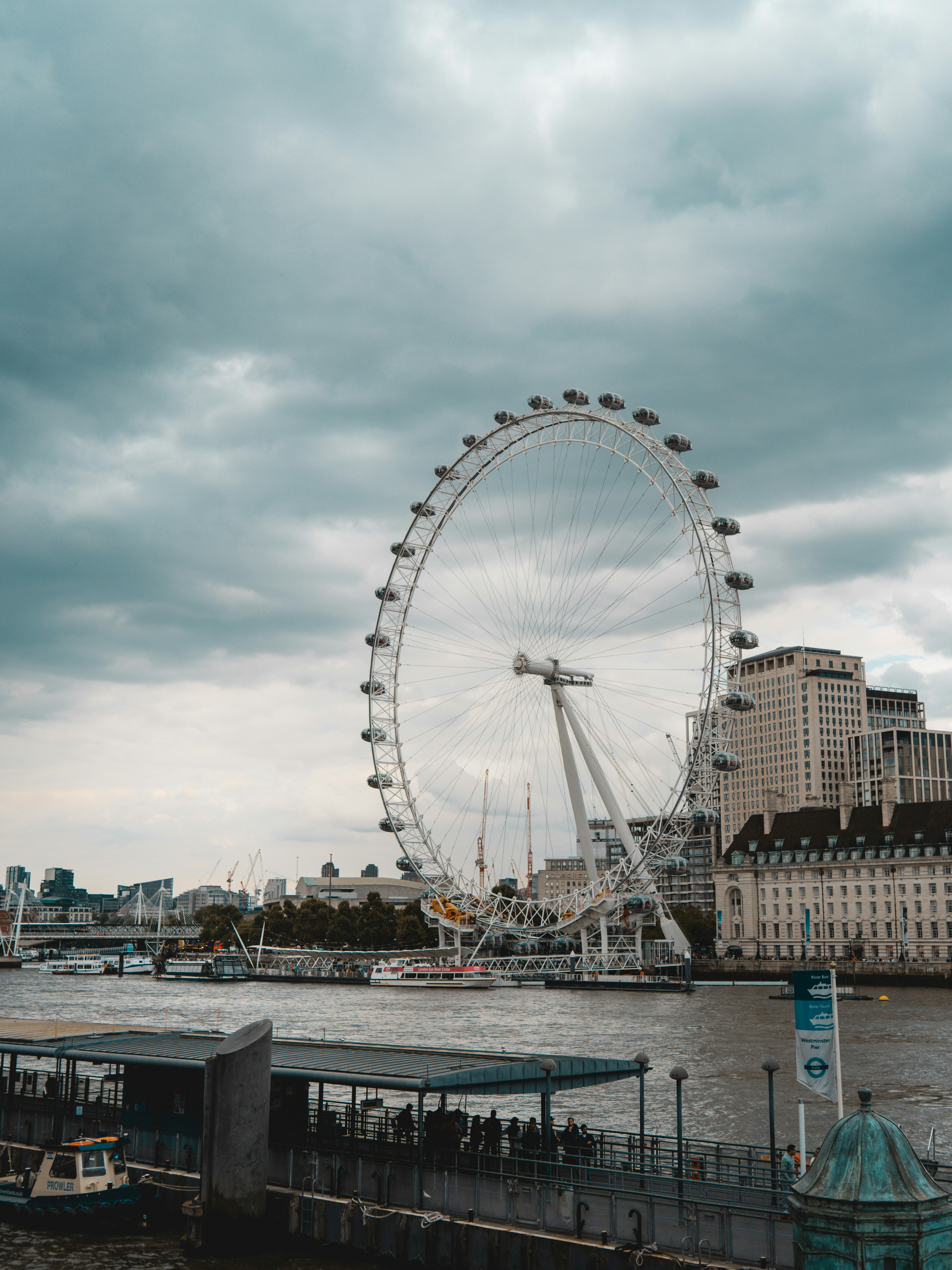 London Eye over the Thames: Sky, Water, and City in Soft Light