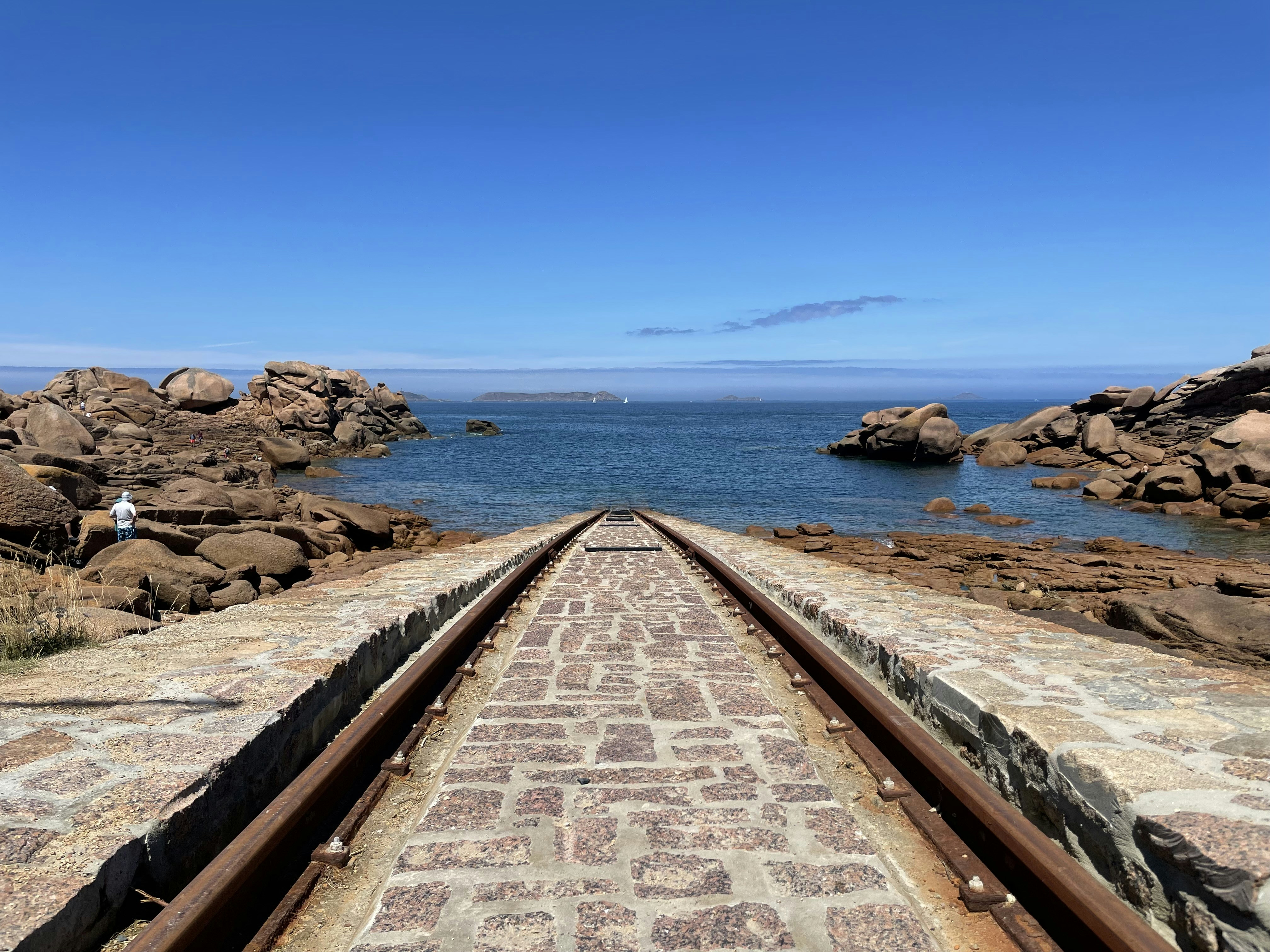 A Sea-Bound Railscape: Stone Path to the Horizon