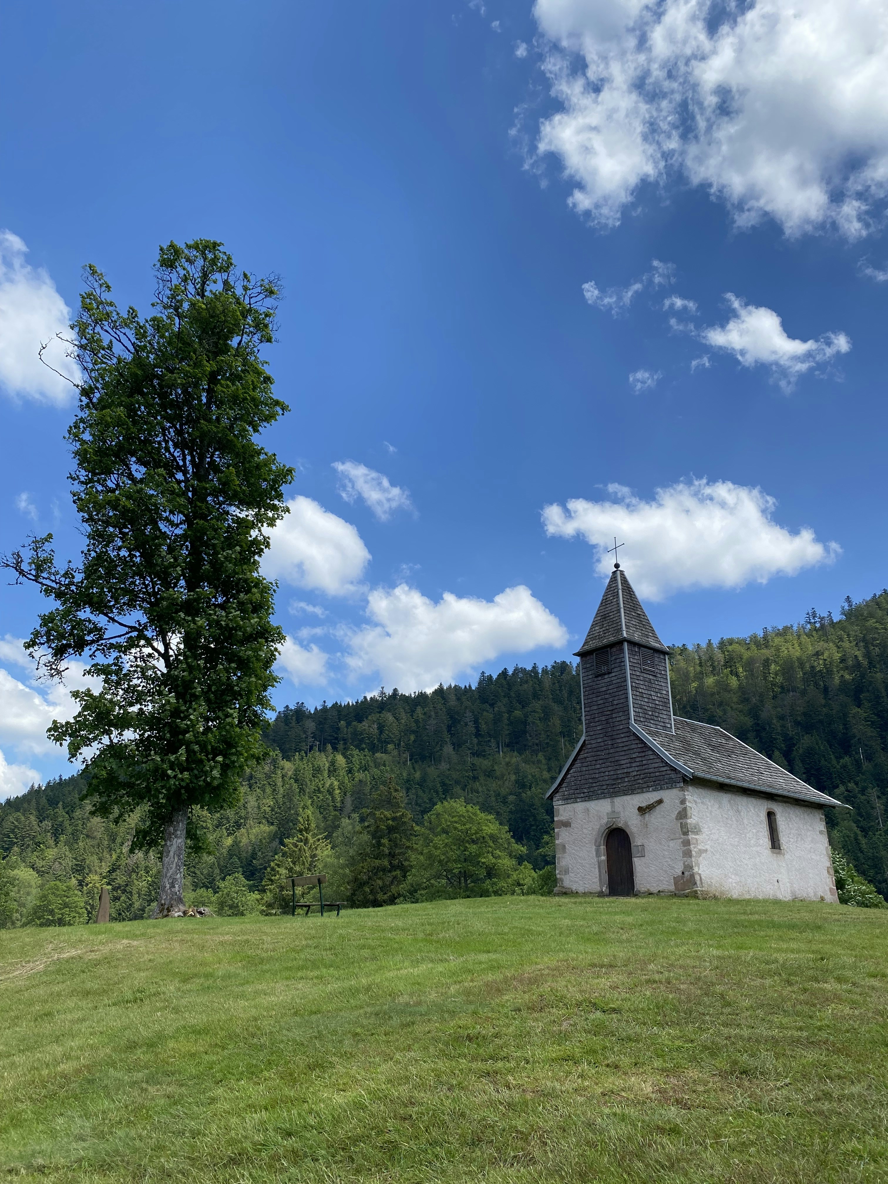 Stone Chapel Beneath a Blue Sky