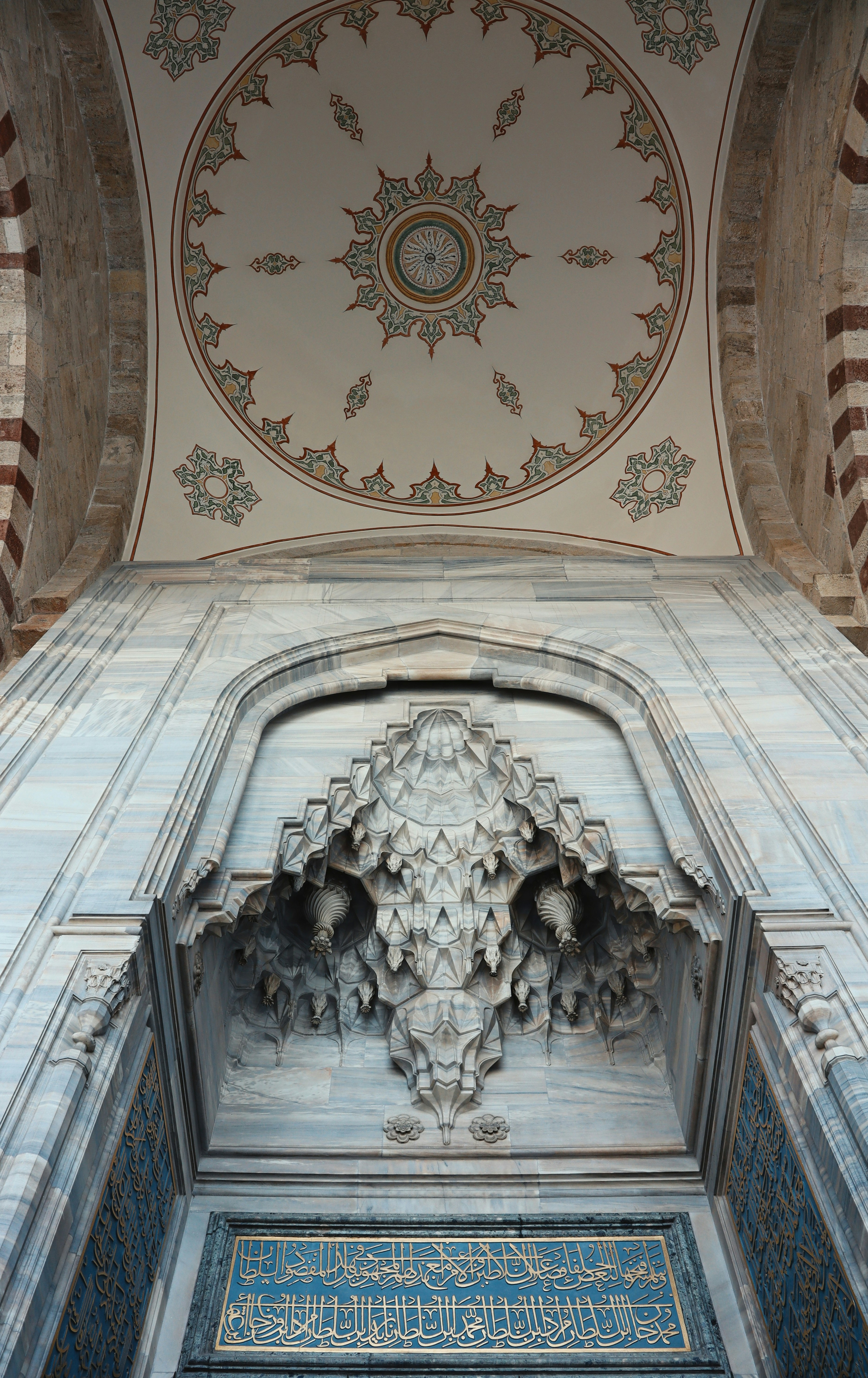 Intricate Marble Archway Framing a Geometric Niche