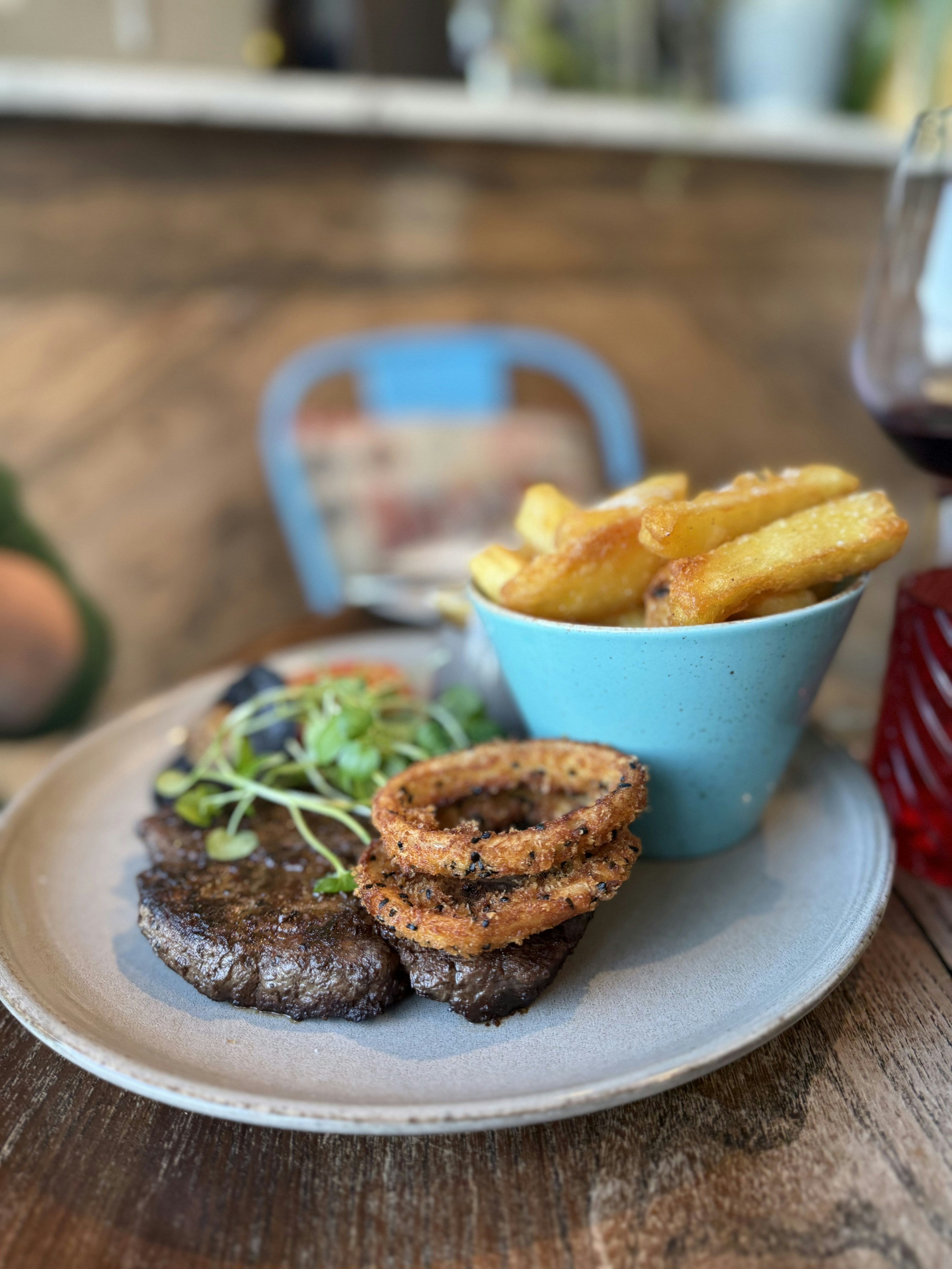 Succulent Bistro Plate: Steak, Onion Rings and Crispy Fries