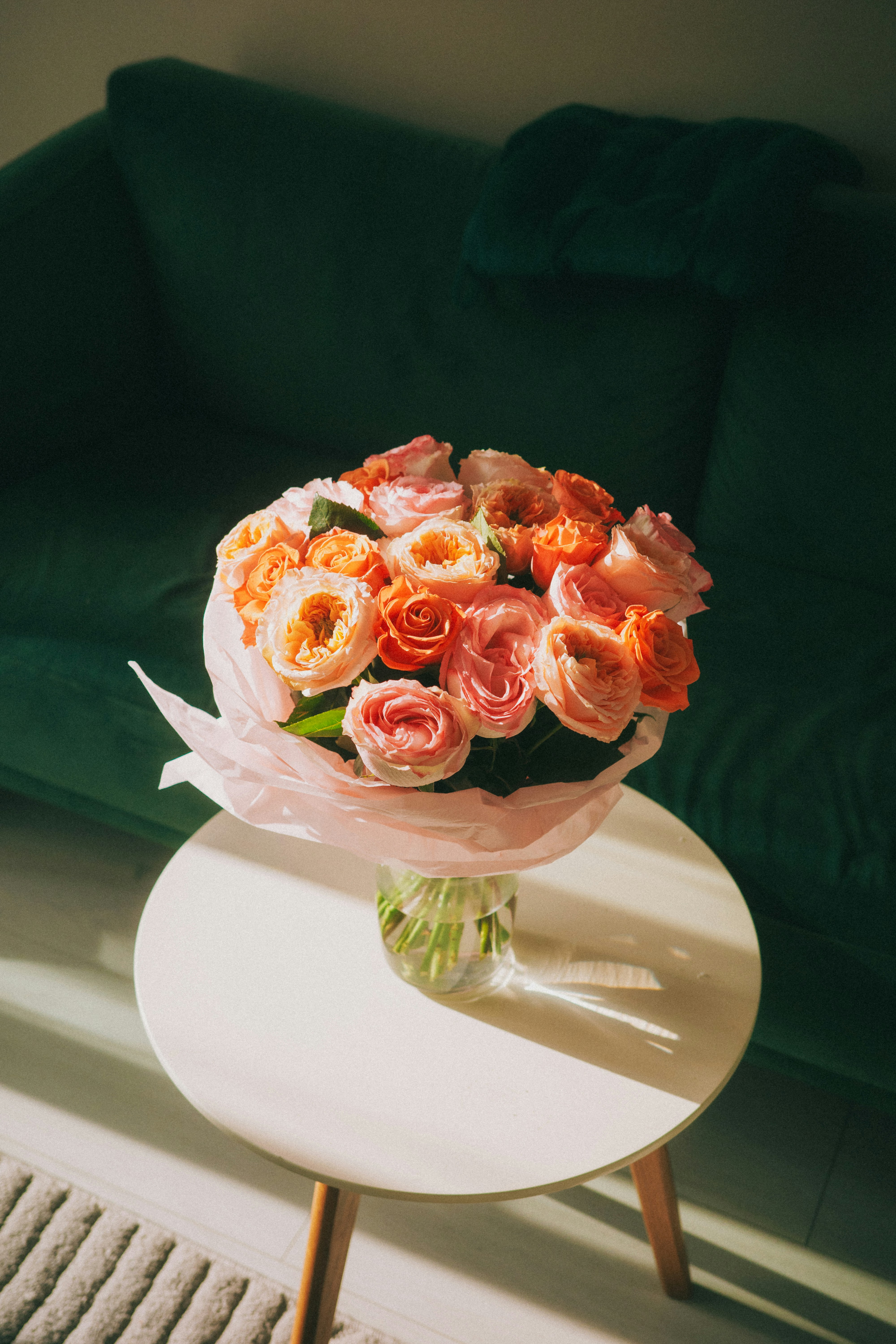 Pastel bouquet on a sunlit side table