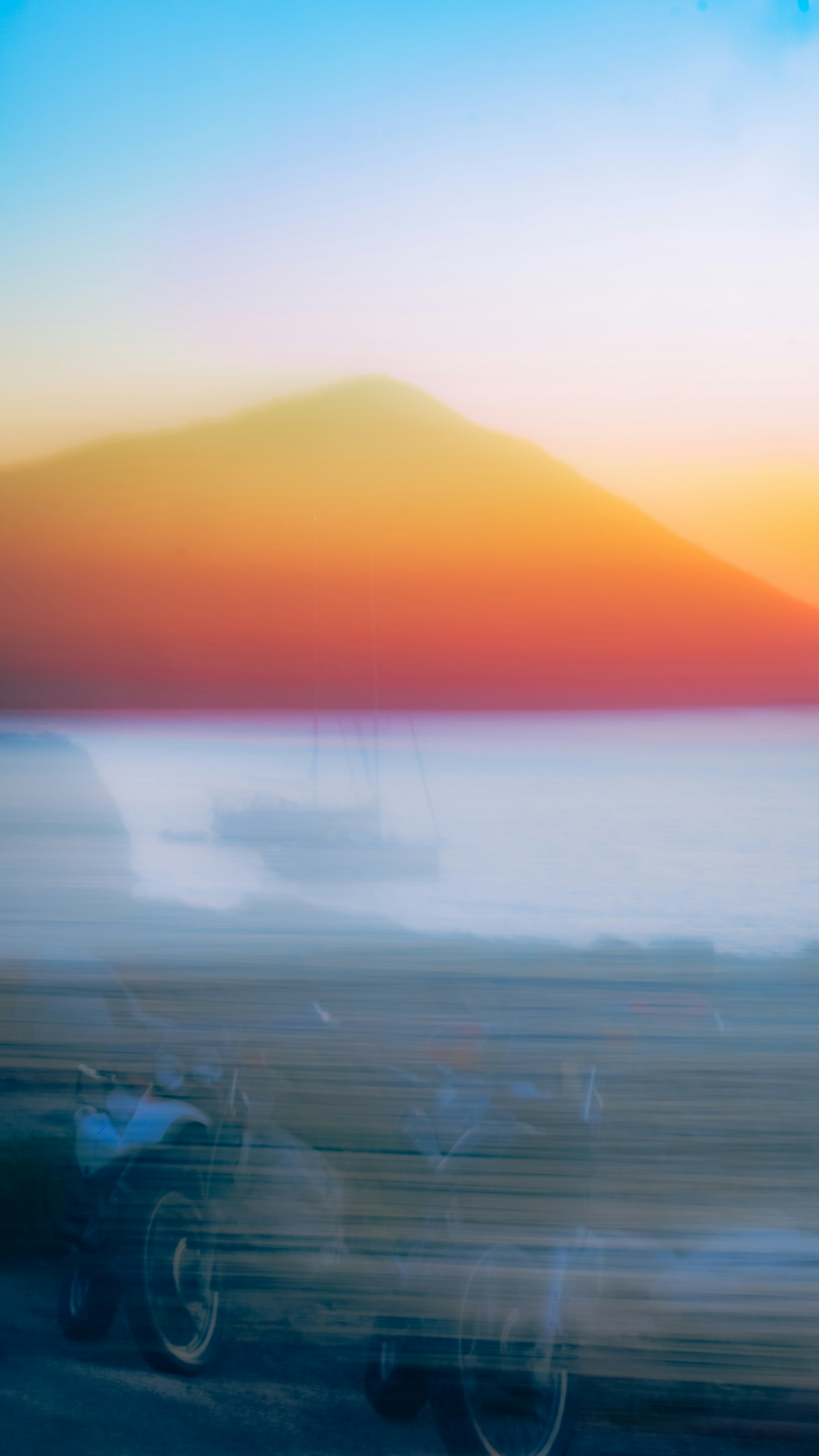 Blurring Horizon: Sunset Over a Quiet Marina