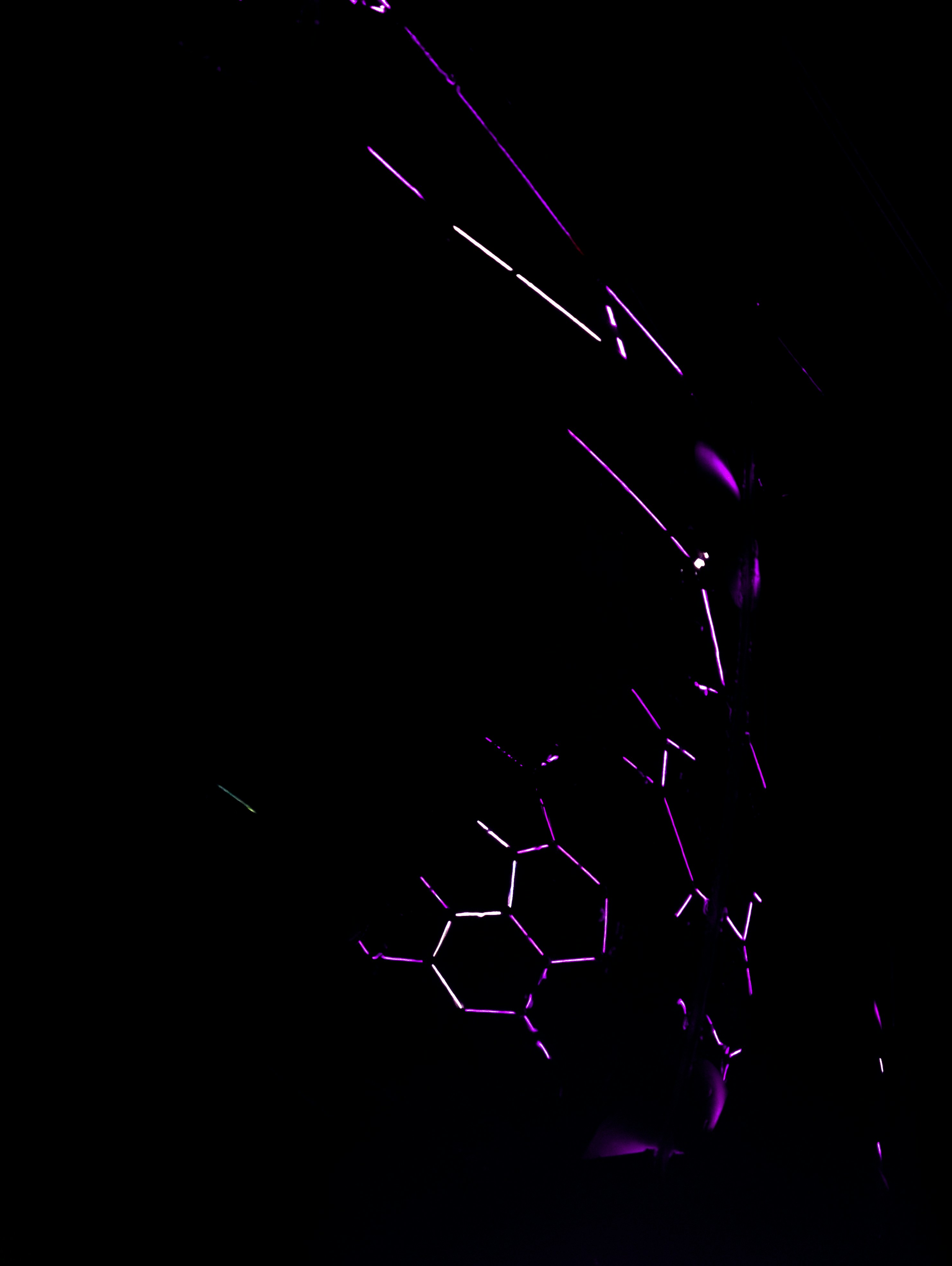 Neon Lace: Fractured Hexagons in Violet Light