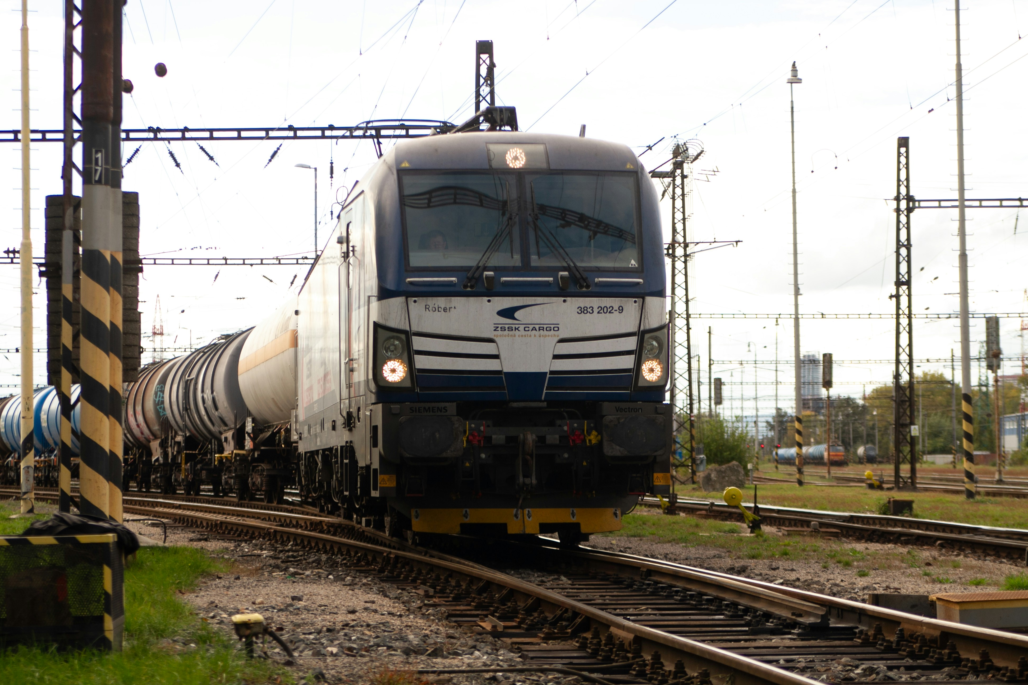 Locomotive on the Rail: A Freight Train Surges Forward