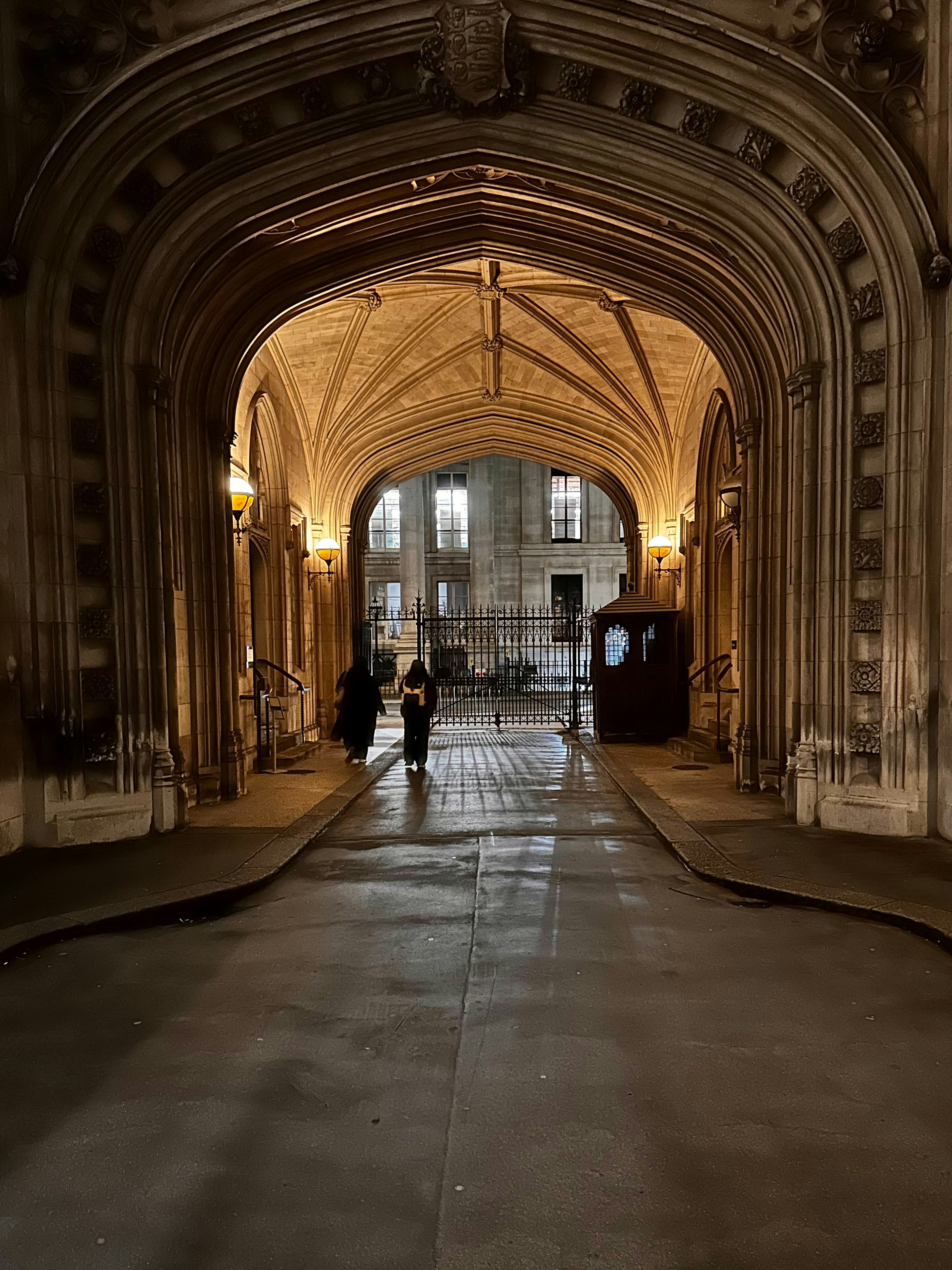 Gateway to the Archive: Warm Light in a Majestic Archway