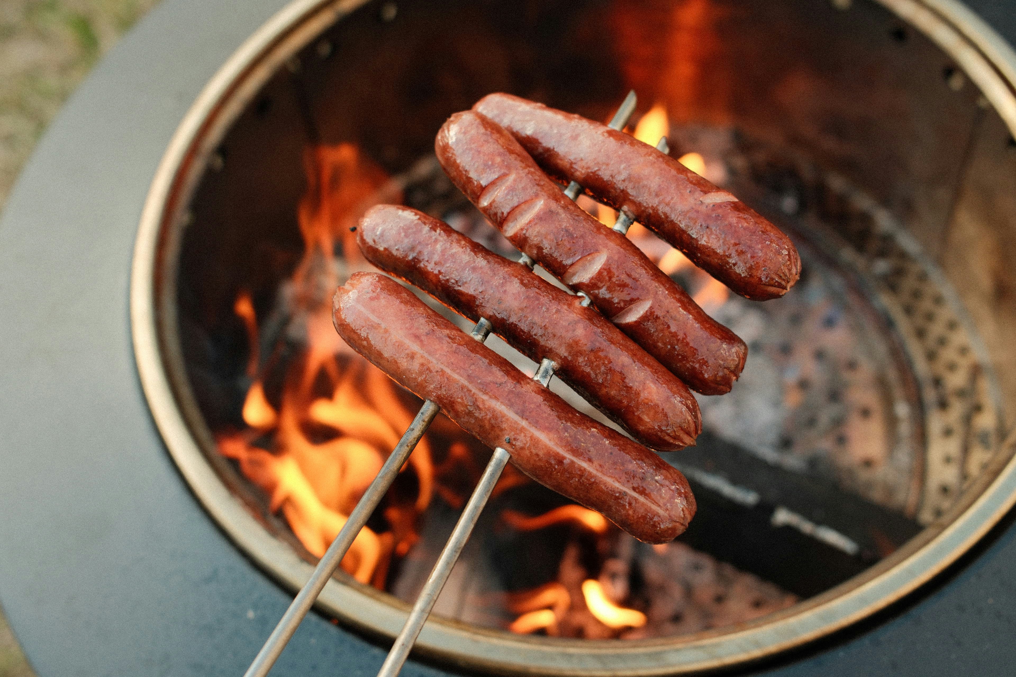 Grilled Sausages on a Smoky Ringed Grill