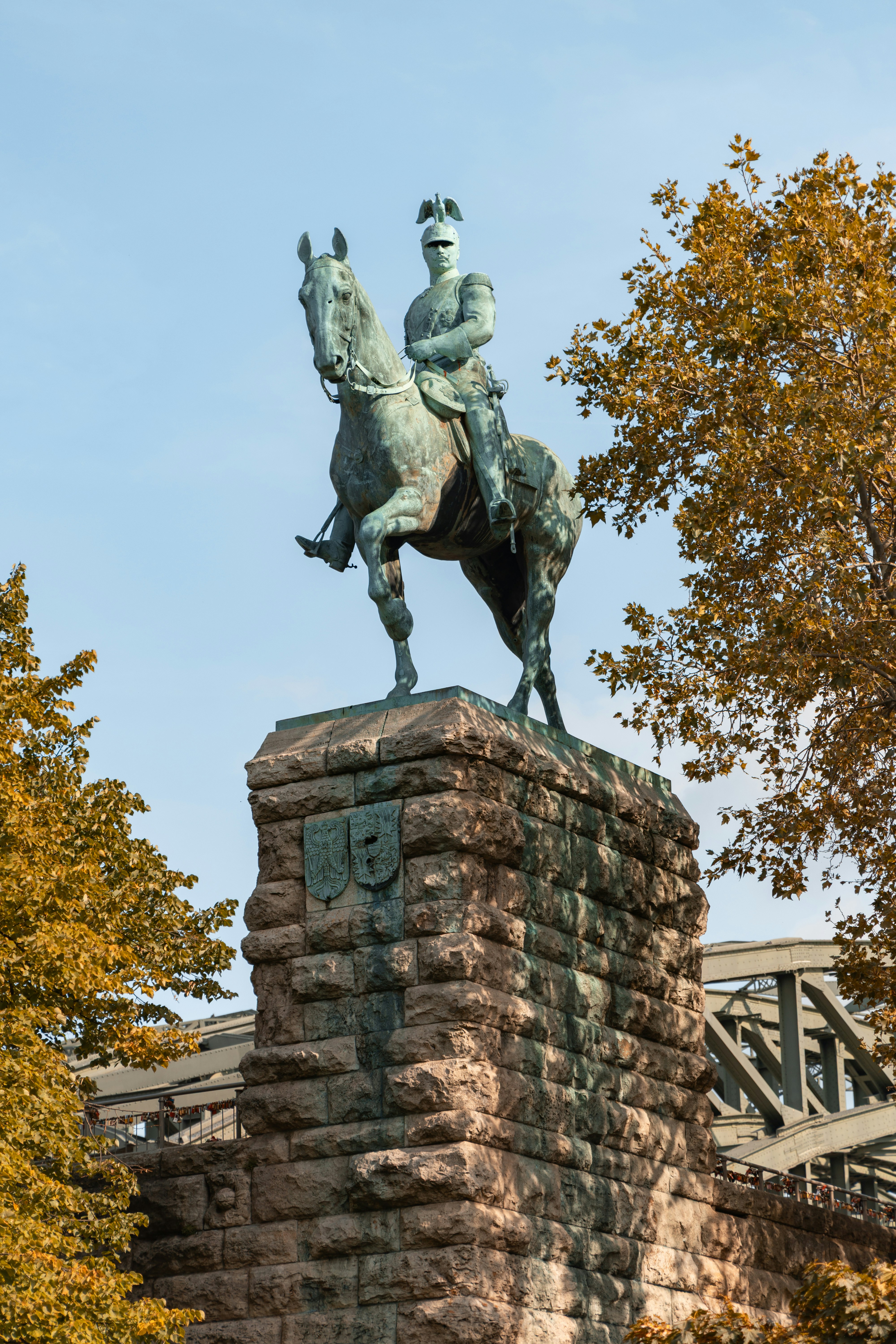 Equestrian Valor: Monument Rider ascending the Stone Pedestal