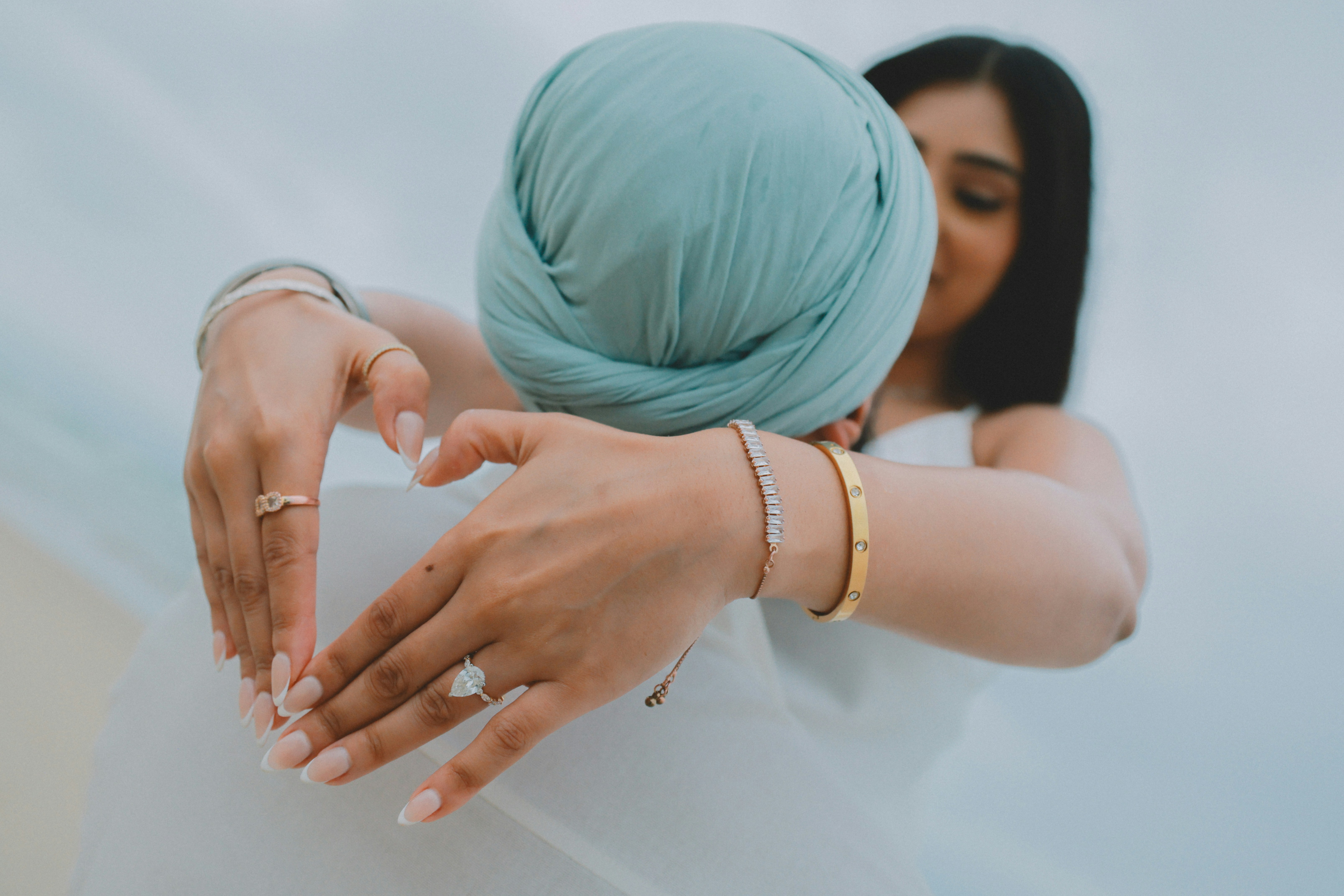 Wrap of rings and arms: a soft embrace framed by delicate details