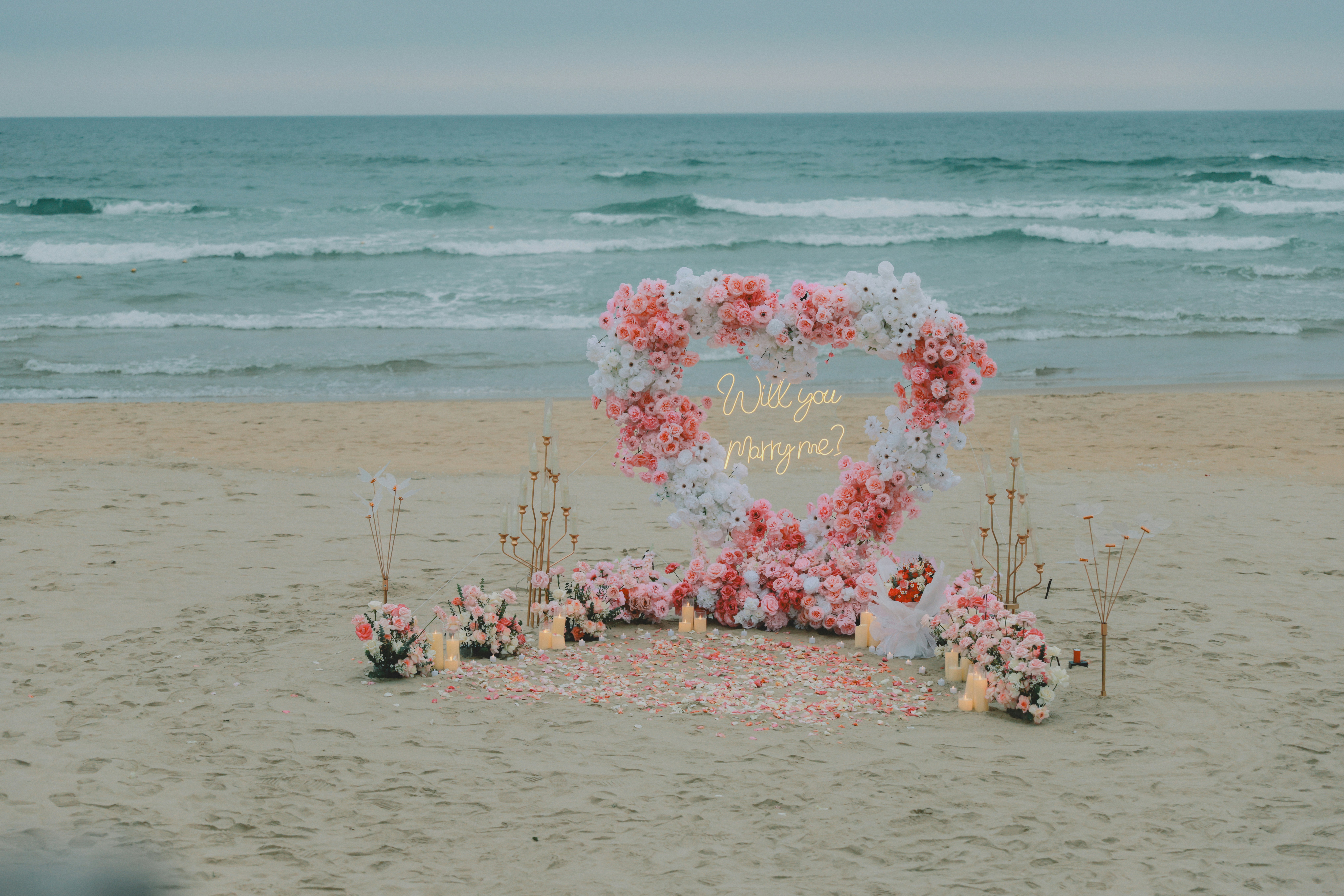 Floral Heart on the Shoreline: A Beachfront Love tribute