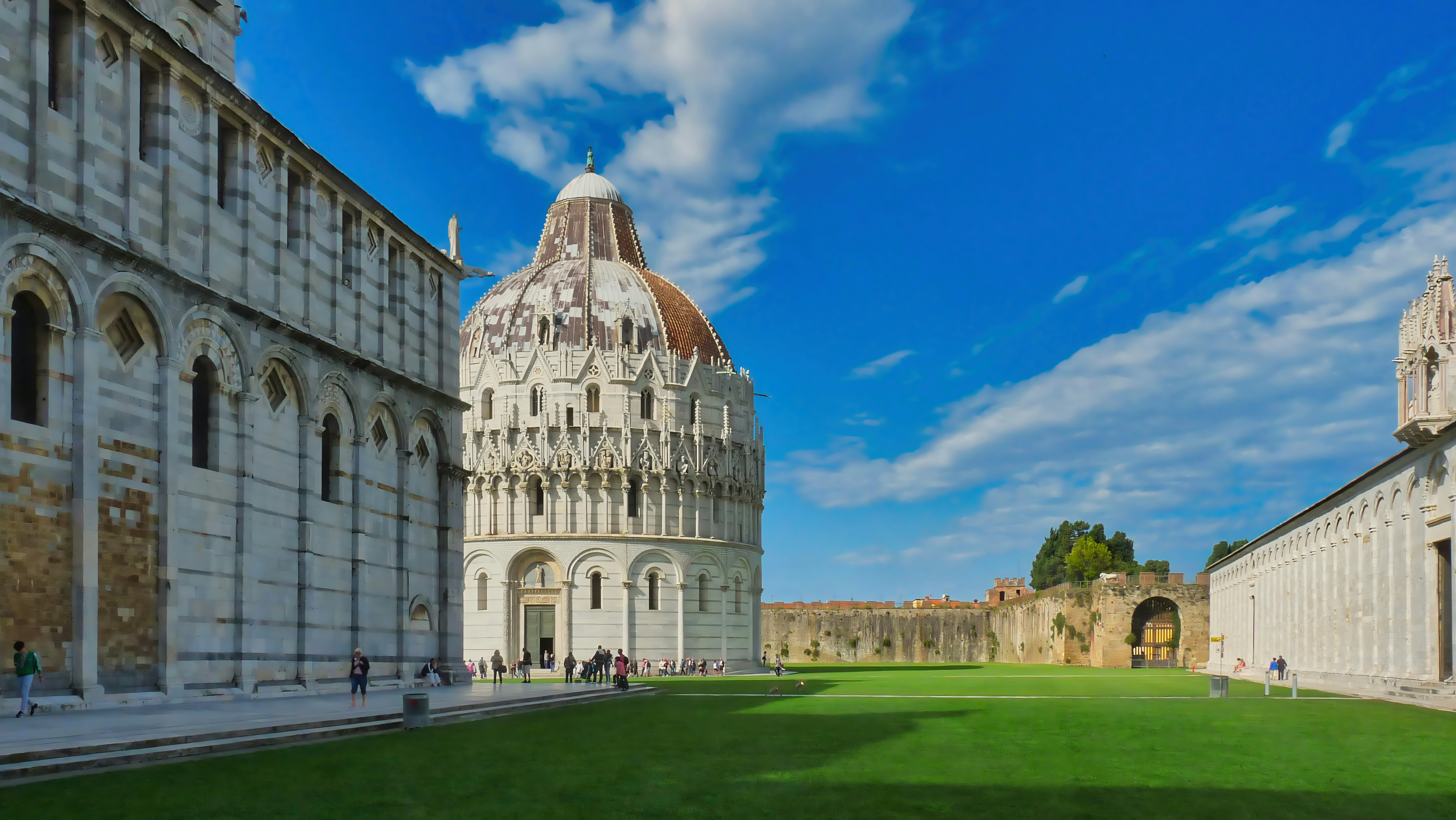 The pisa baptistery and cathedral on a sunny day