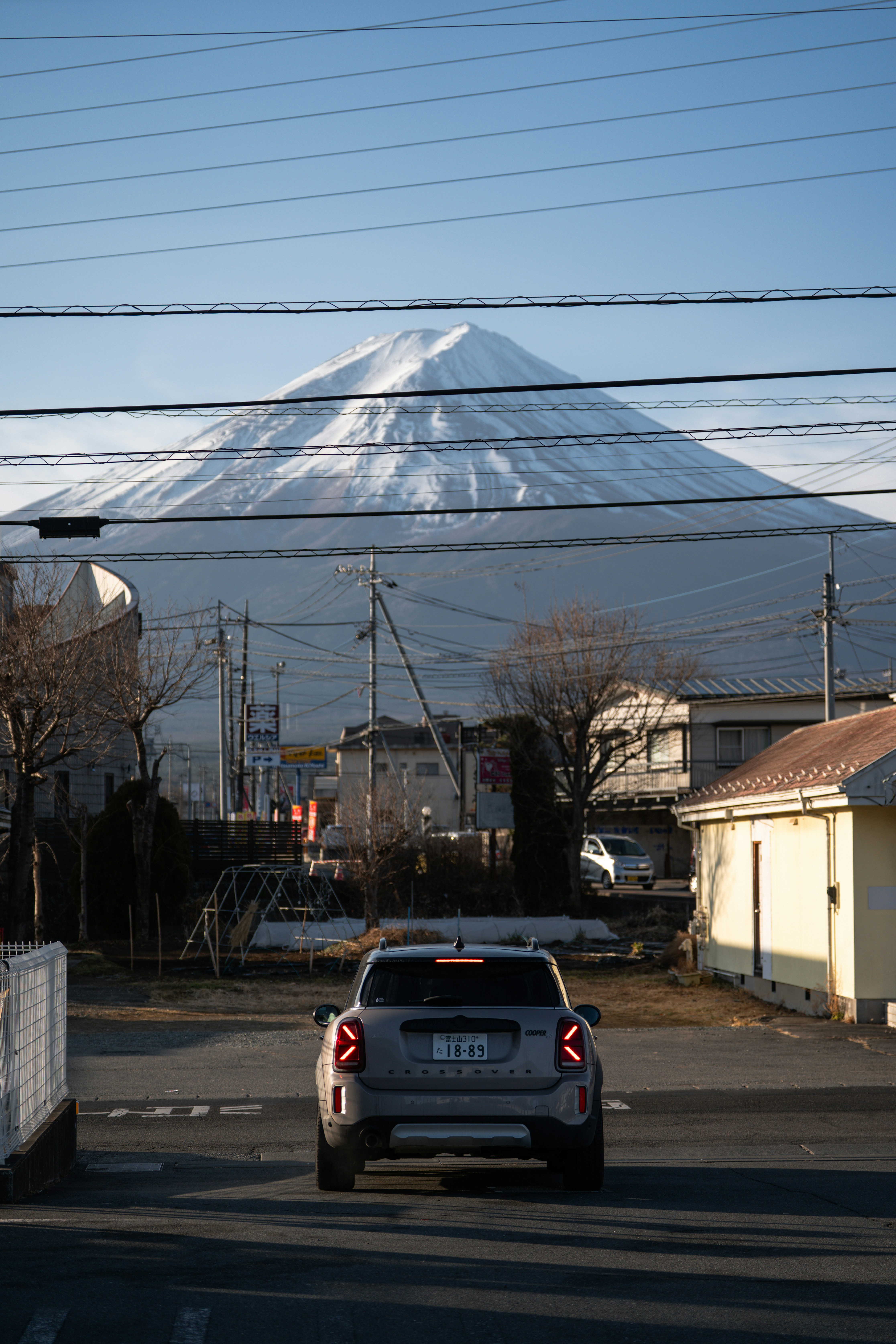 Mt. Fuji over Suburban Street: A Quiet Drive Toward the Snow Peak