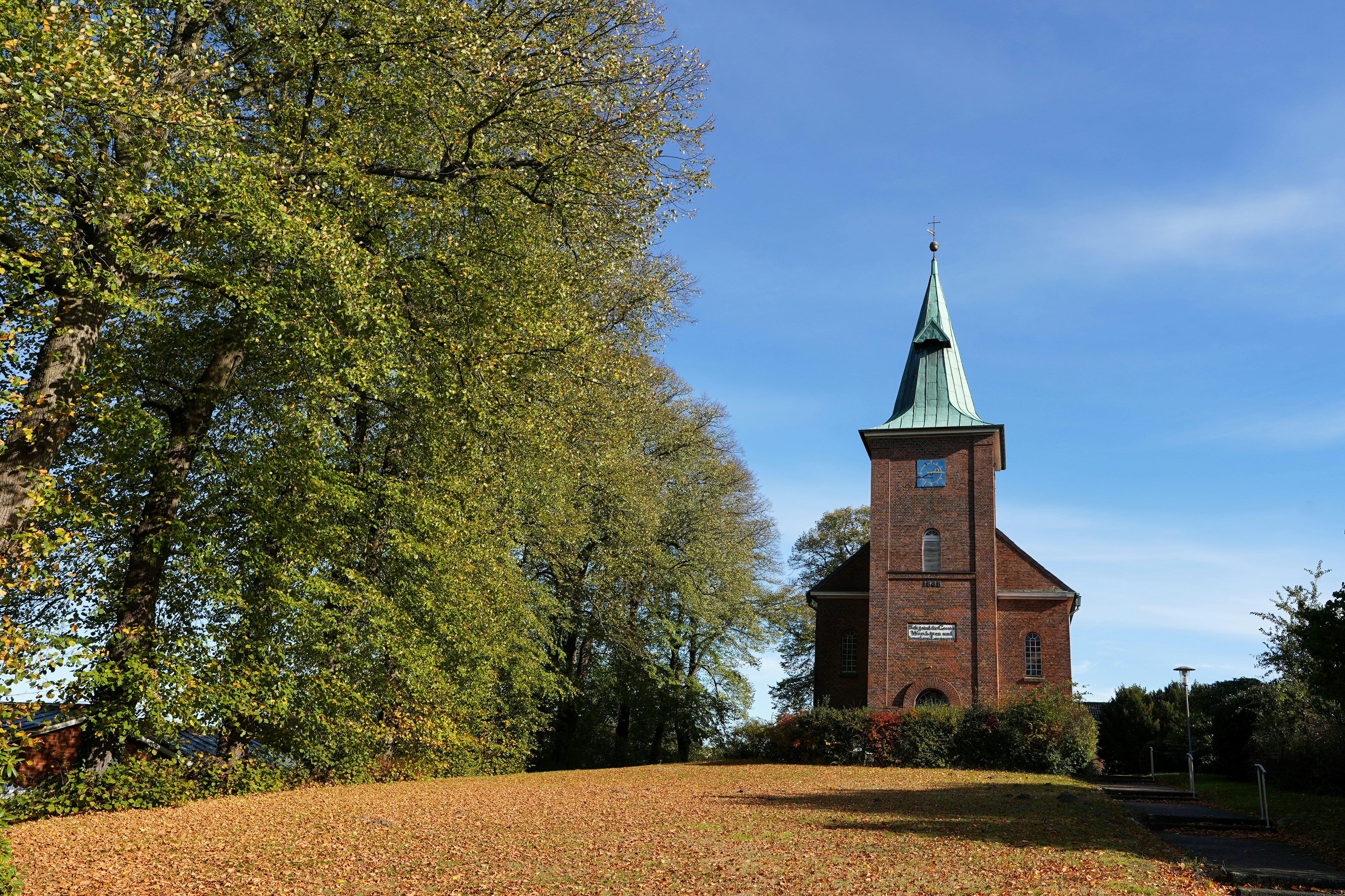 Old Brick Chapel Surrounded by Autumn Light