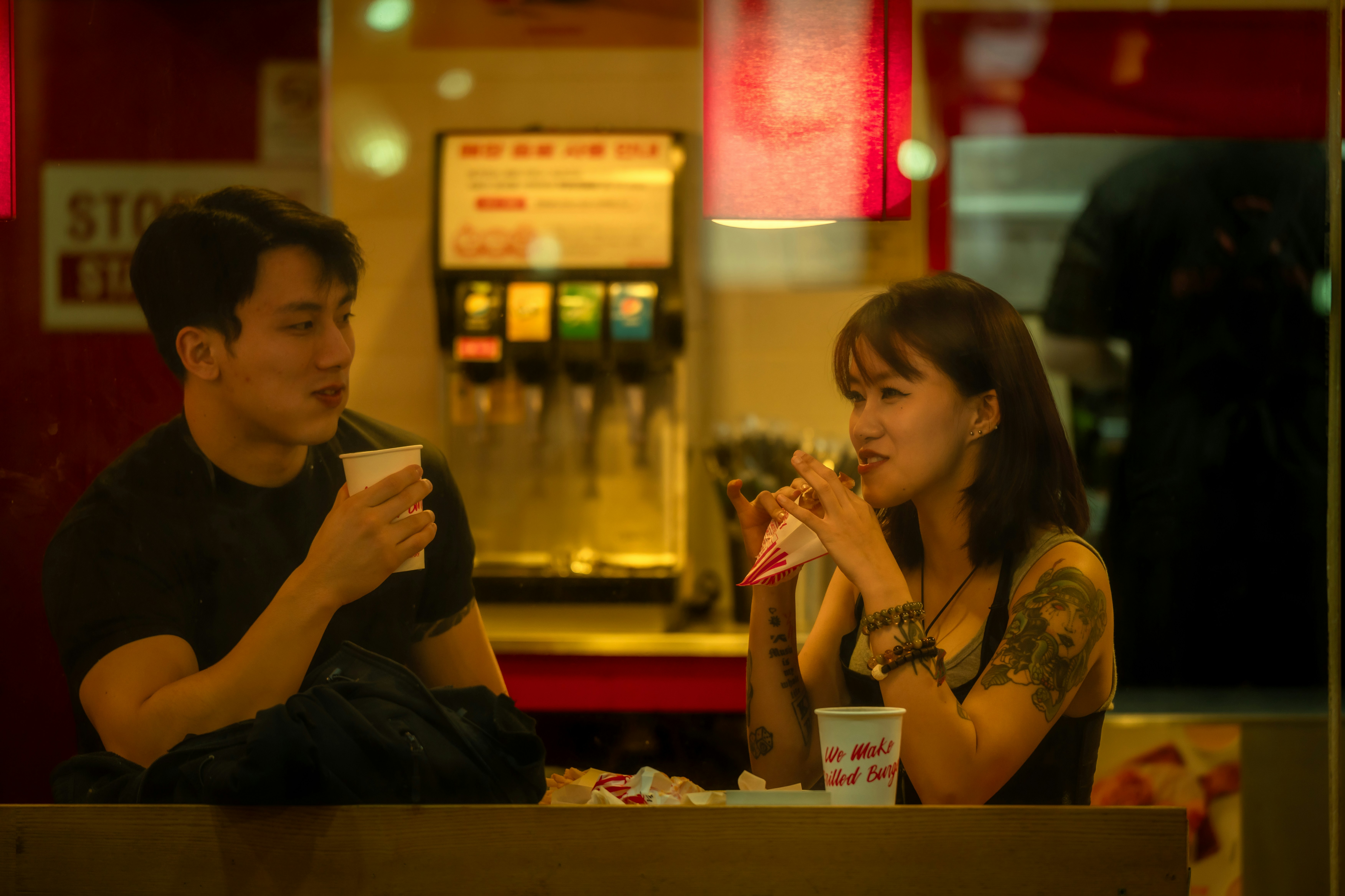 Midnight Drifters: A Quiet Moment Over Drinks