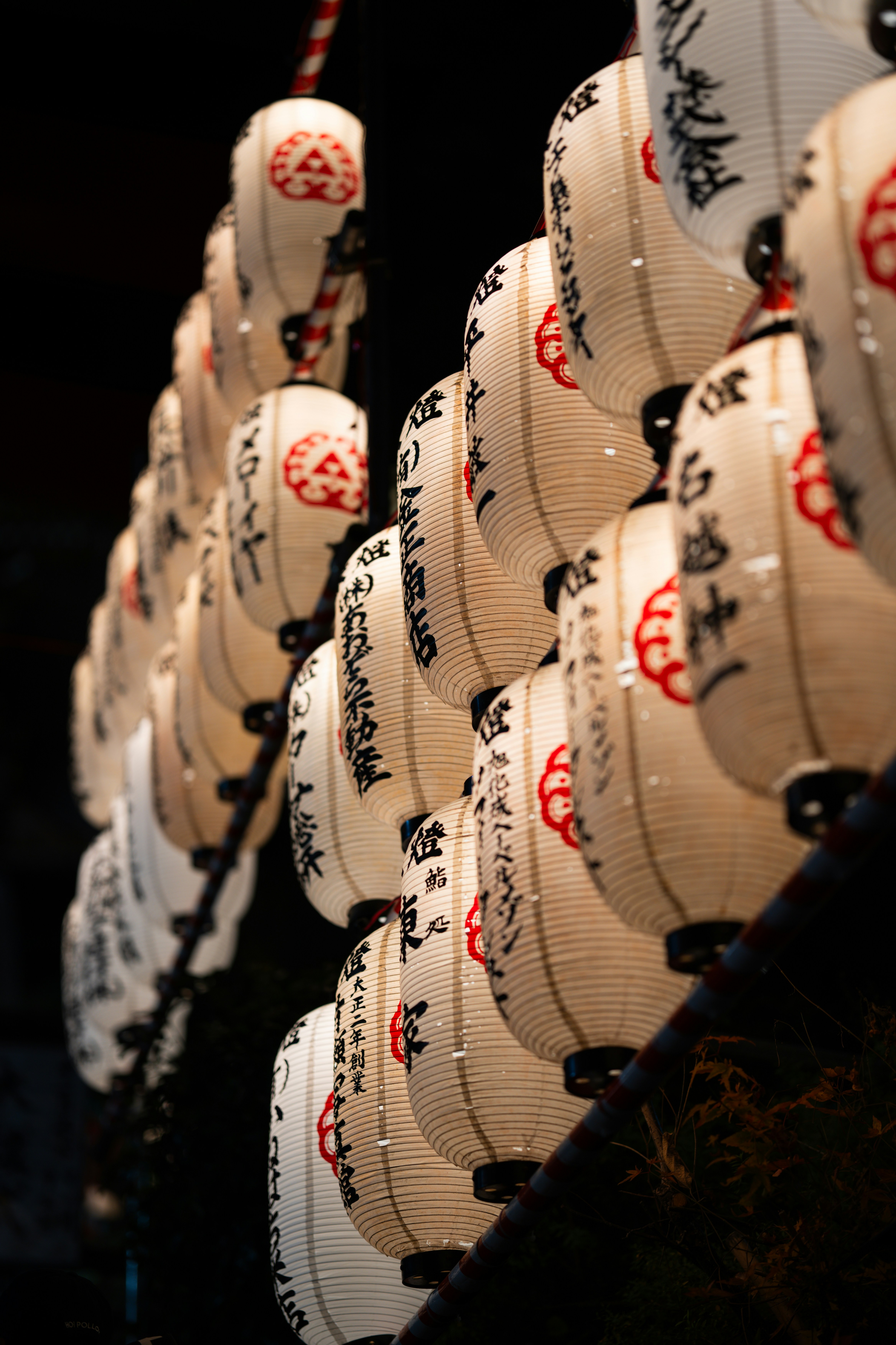 Lantern Corridor: Soft Light on a Row of Japanese Paper Orbs