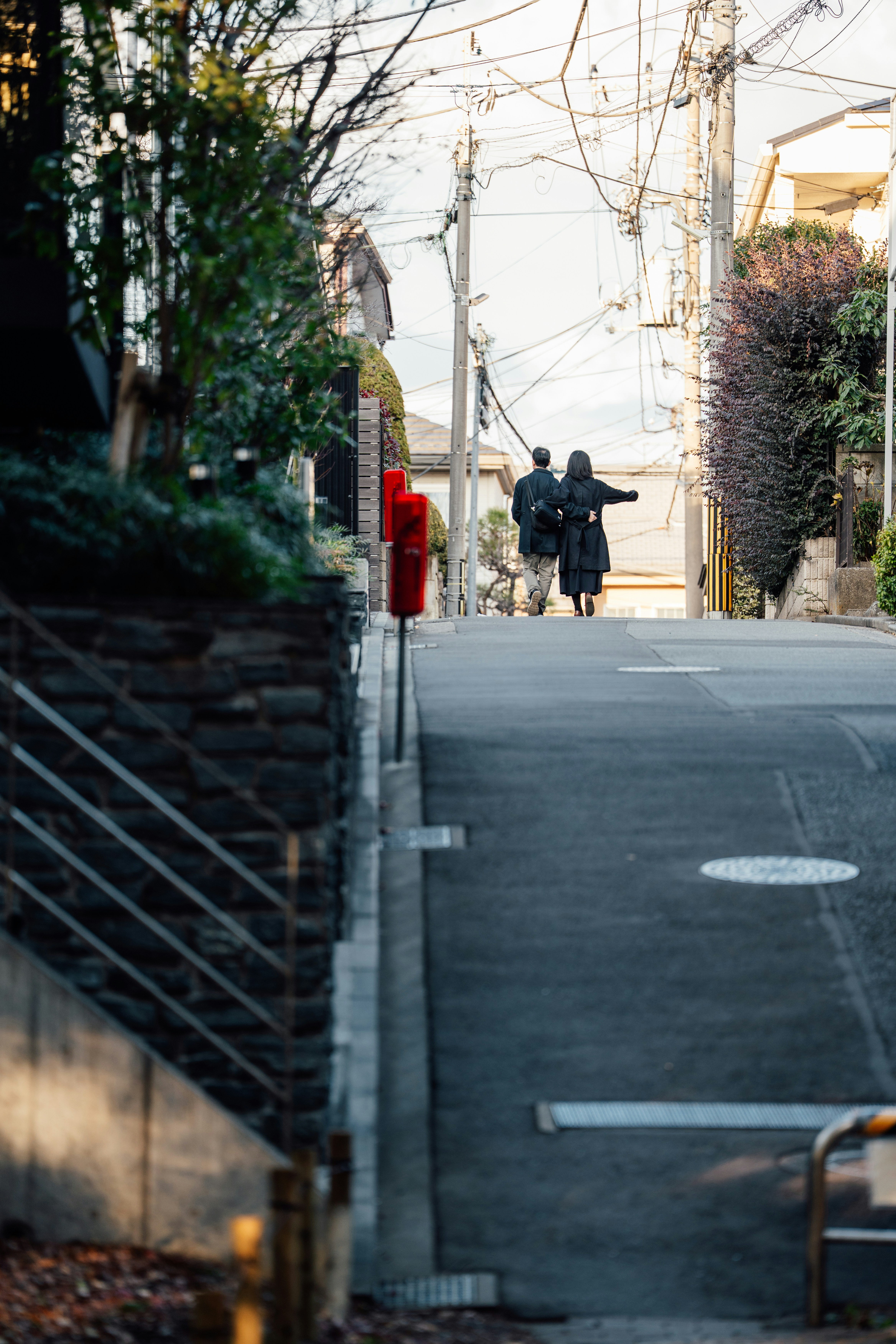 Two Figures at the End of a Quiet Street