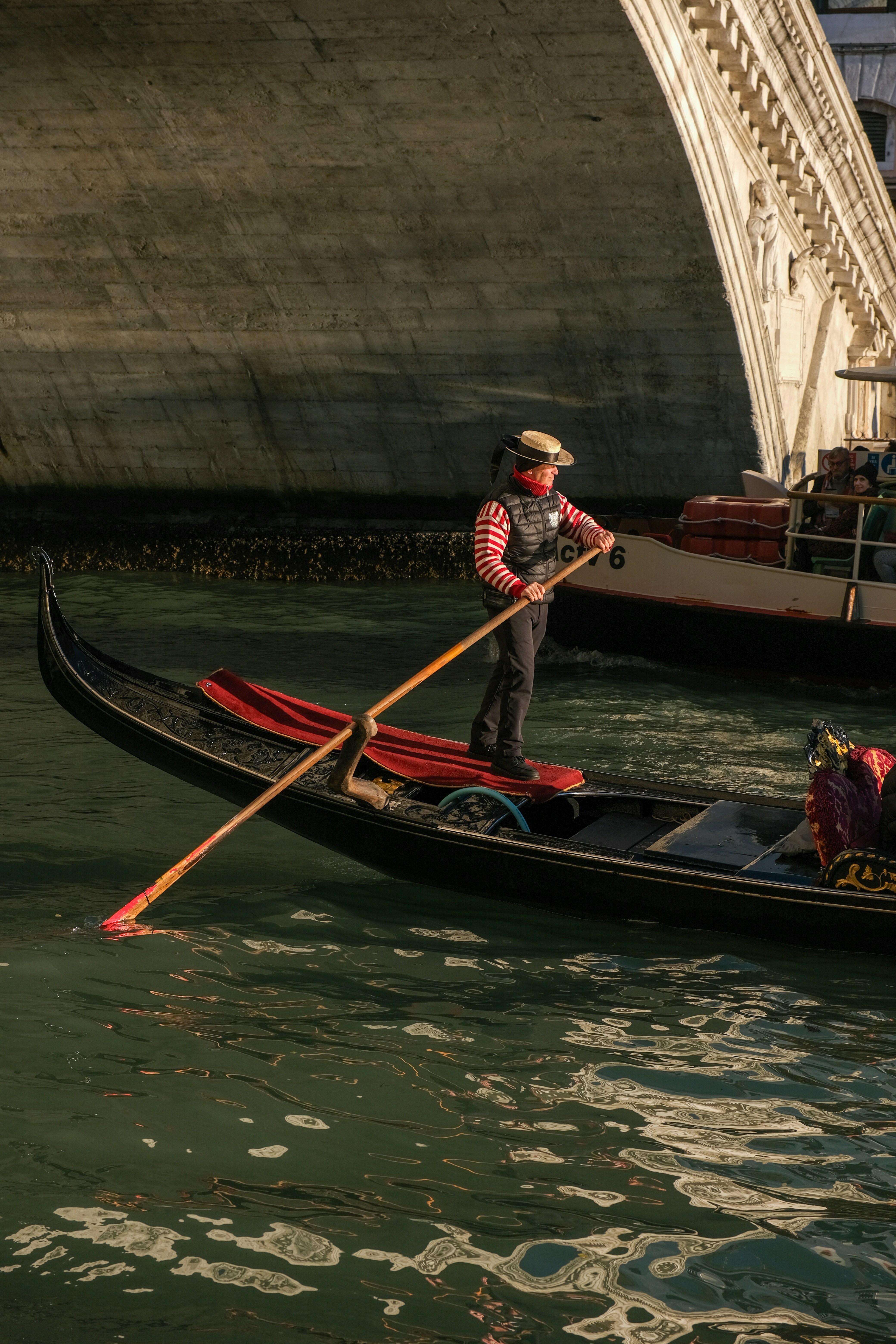 Gondolier at the Rialto: Oars in a Quiet Evening Under the Bridge