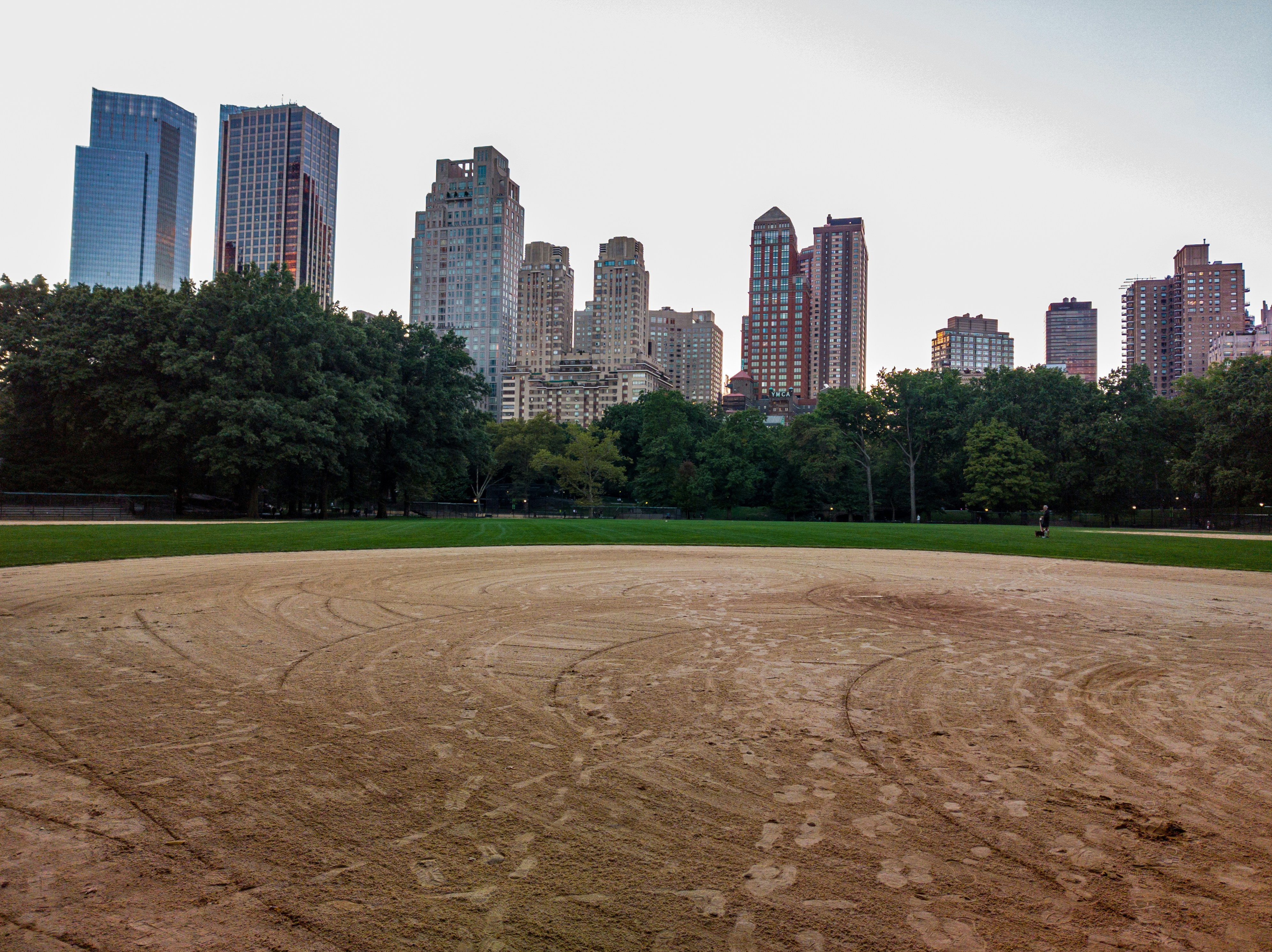 Baseball field with city skyline in the background