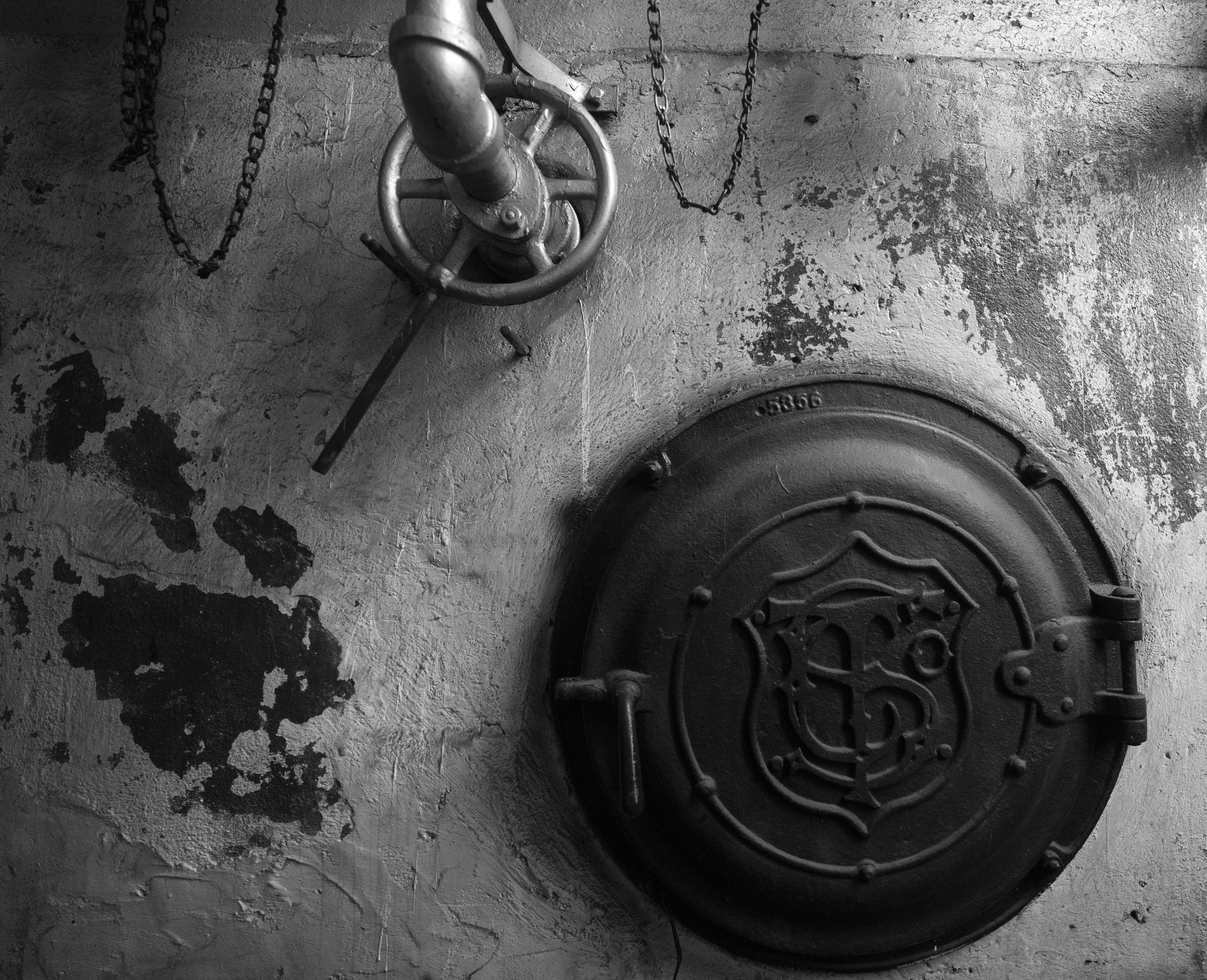 Industrial Eye: Lock and Lever Set Against Weathered Concrete