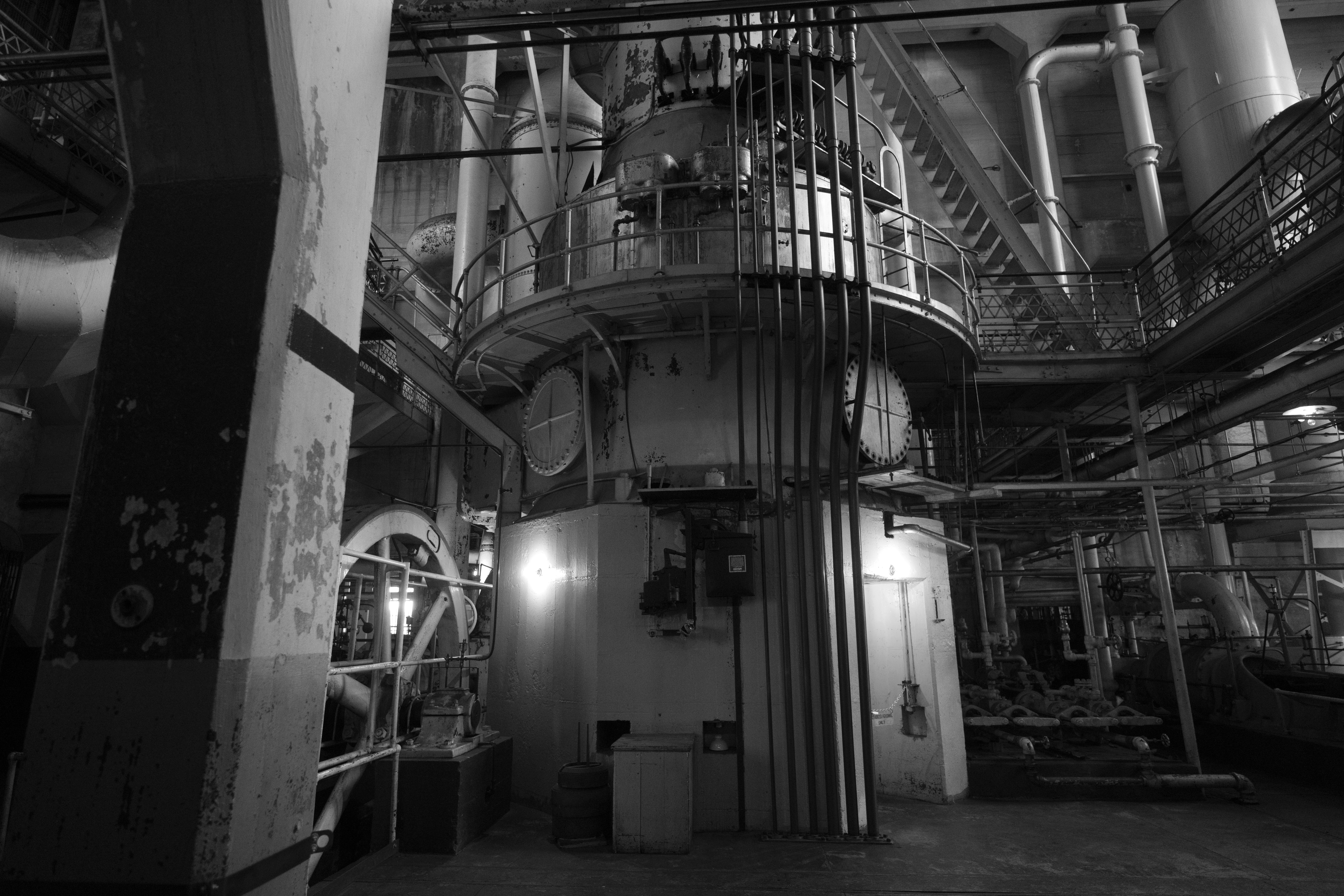 Monumental Machinery: A Silent Factory Hall in Monochrome
