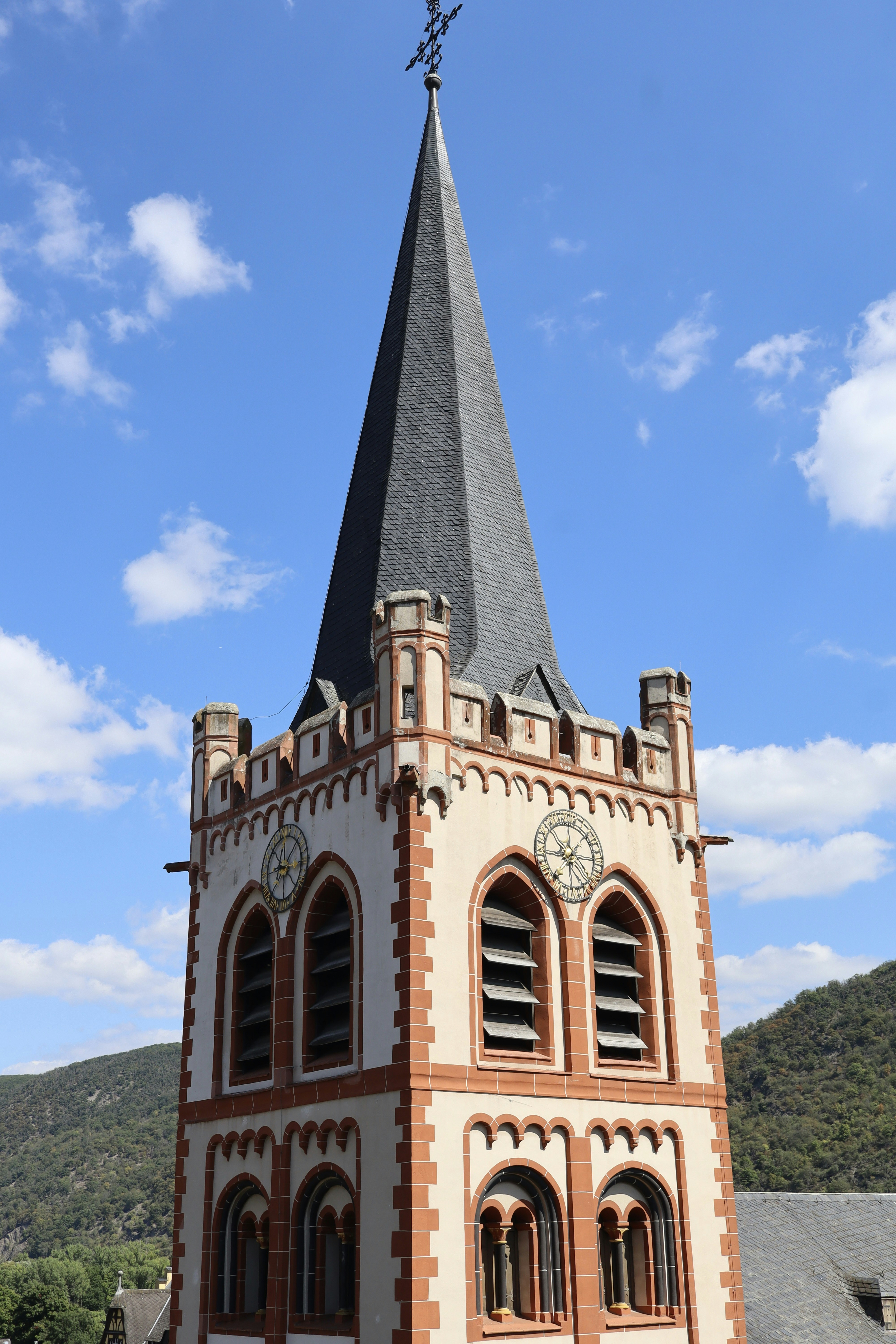 Graceful Spire: A Gothic Clocktower Reaches for the Blue Sky