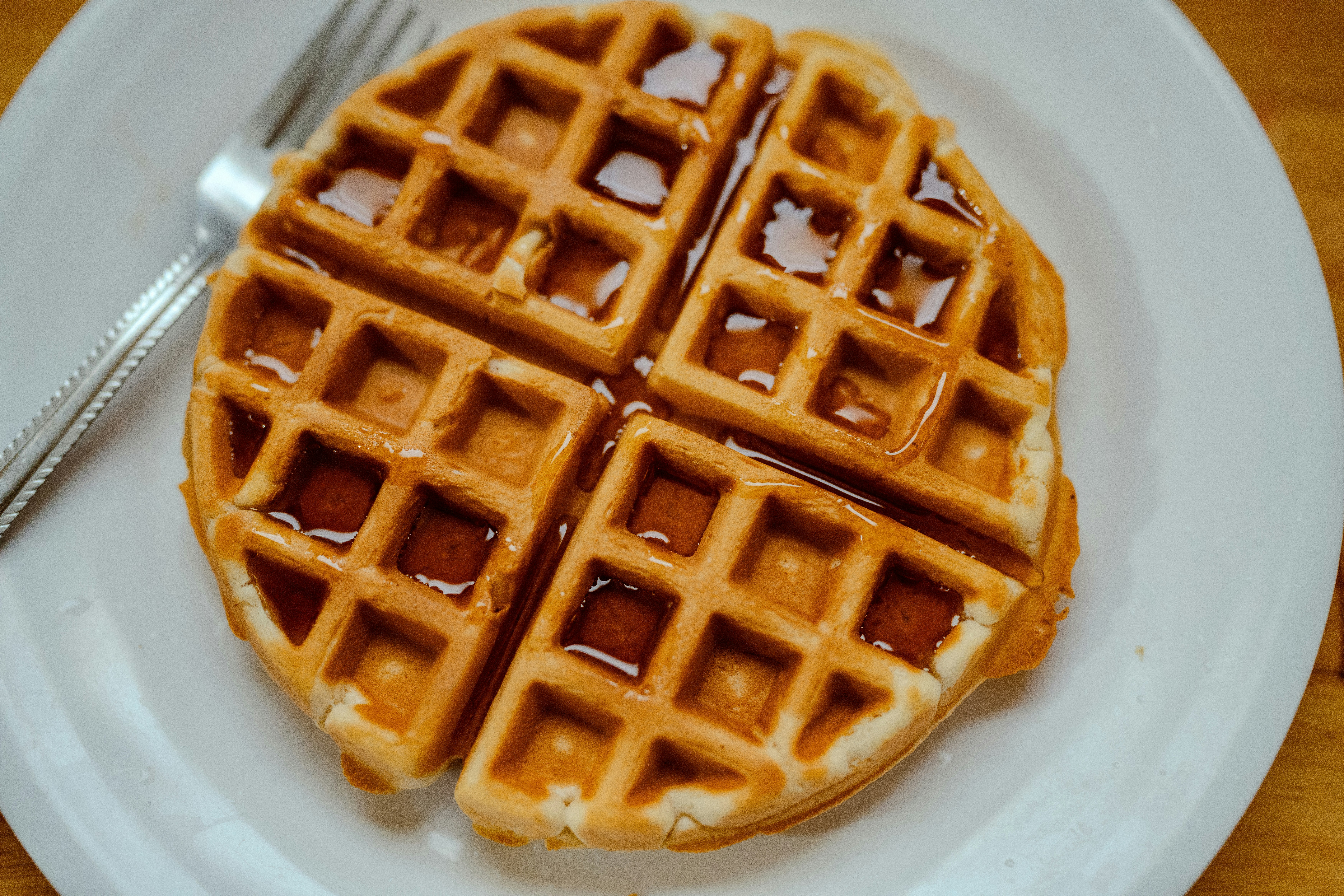 Golden Grid: A Waffle with Syrup Squares in Quiet Morning Light