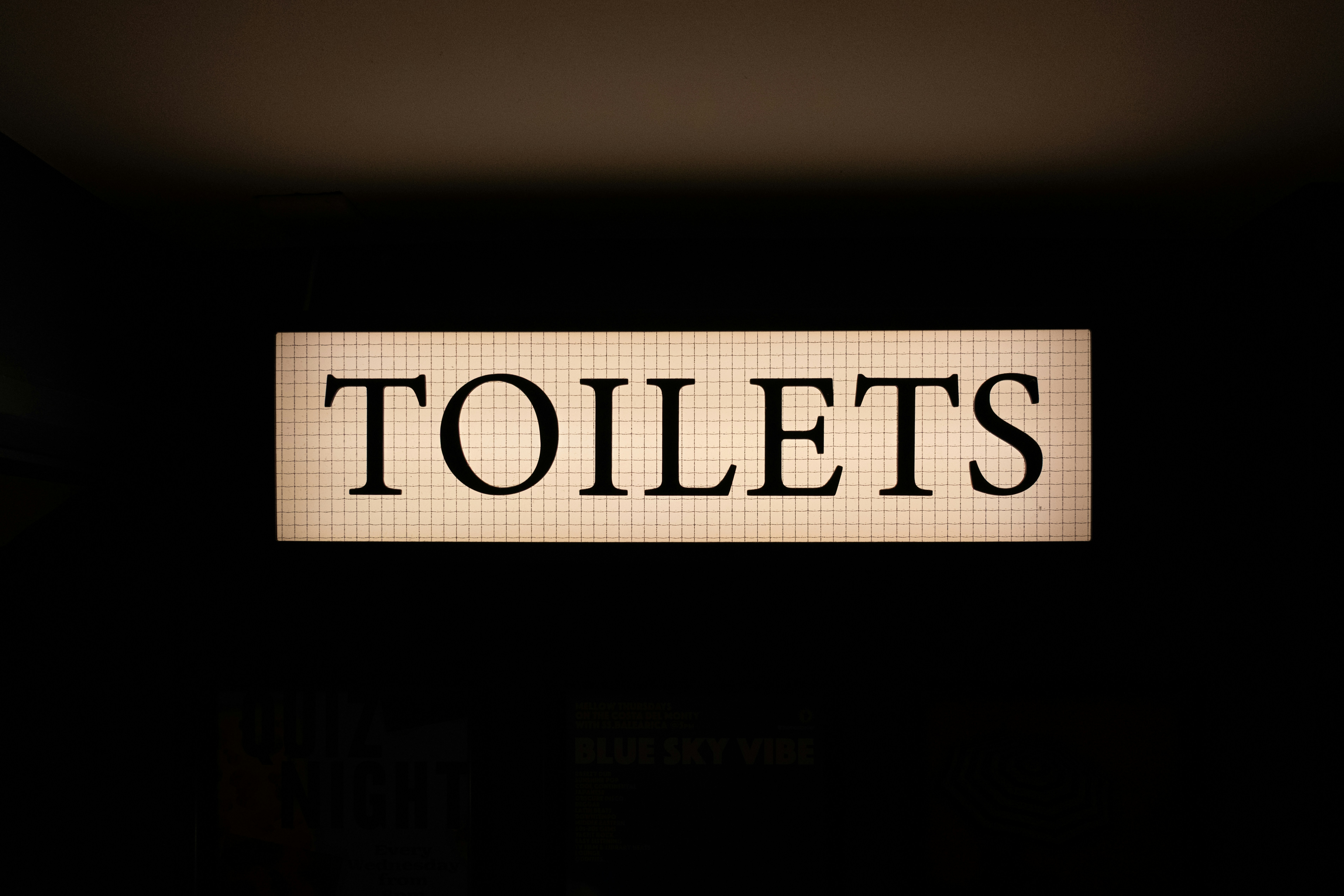 Signage in the Dark Corridor