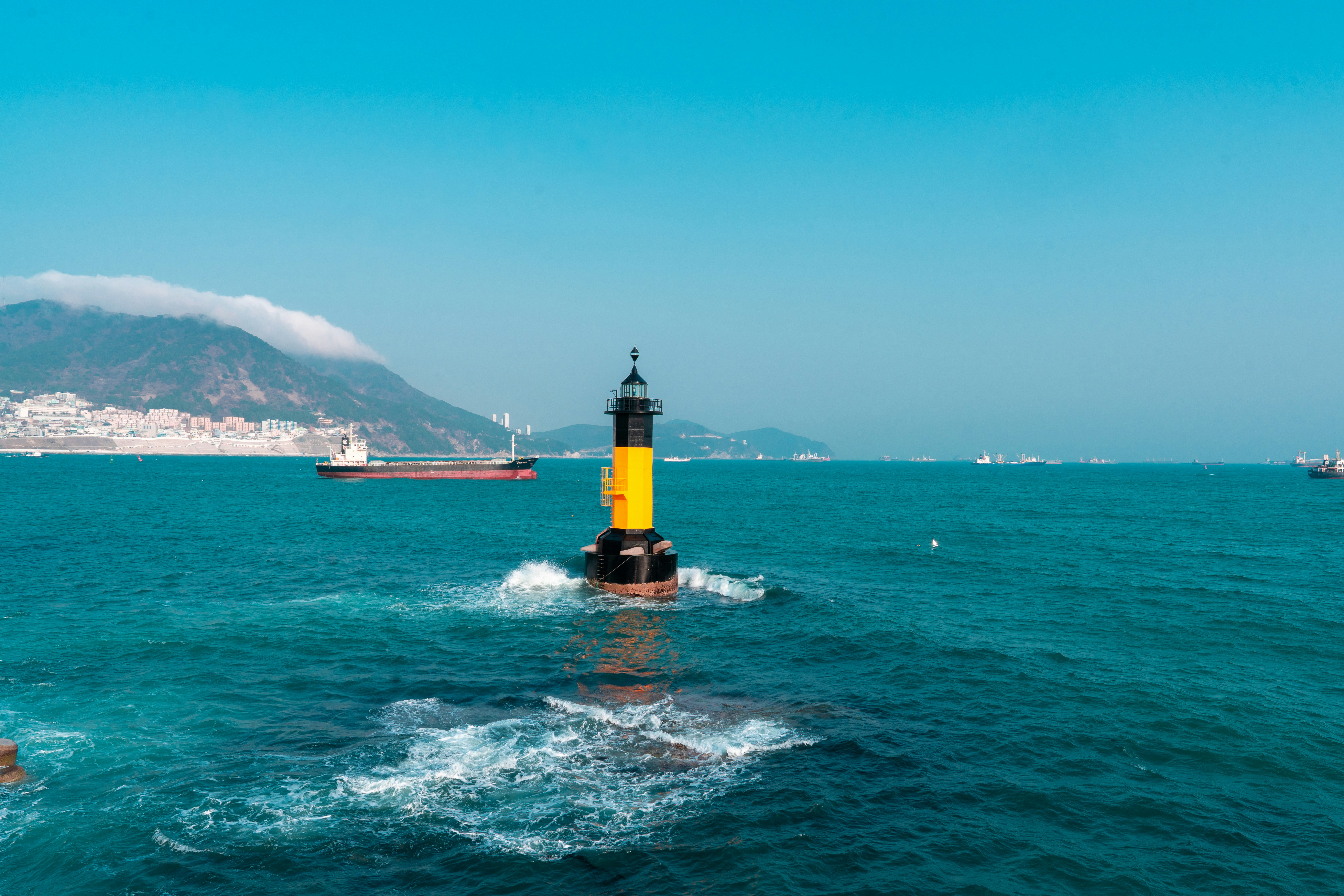 Yellow Beacon on the Blue Sea: A Vessel-lit Channel