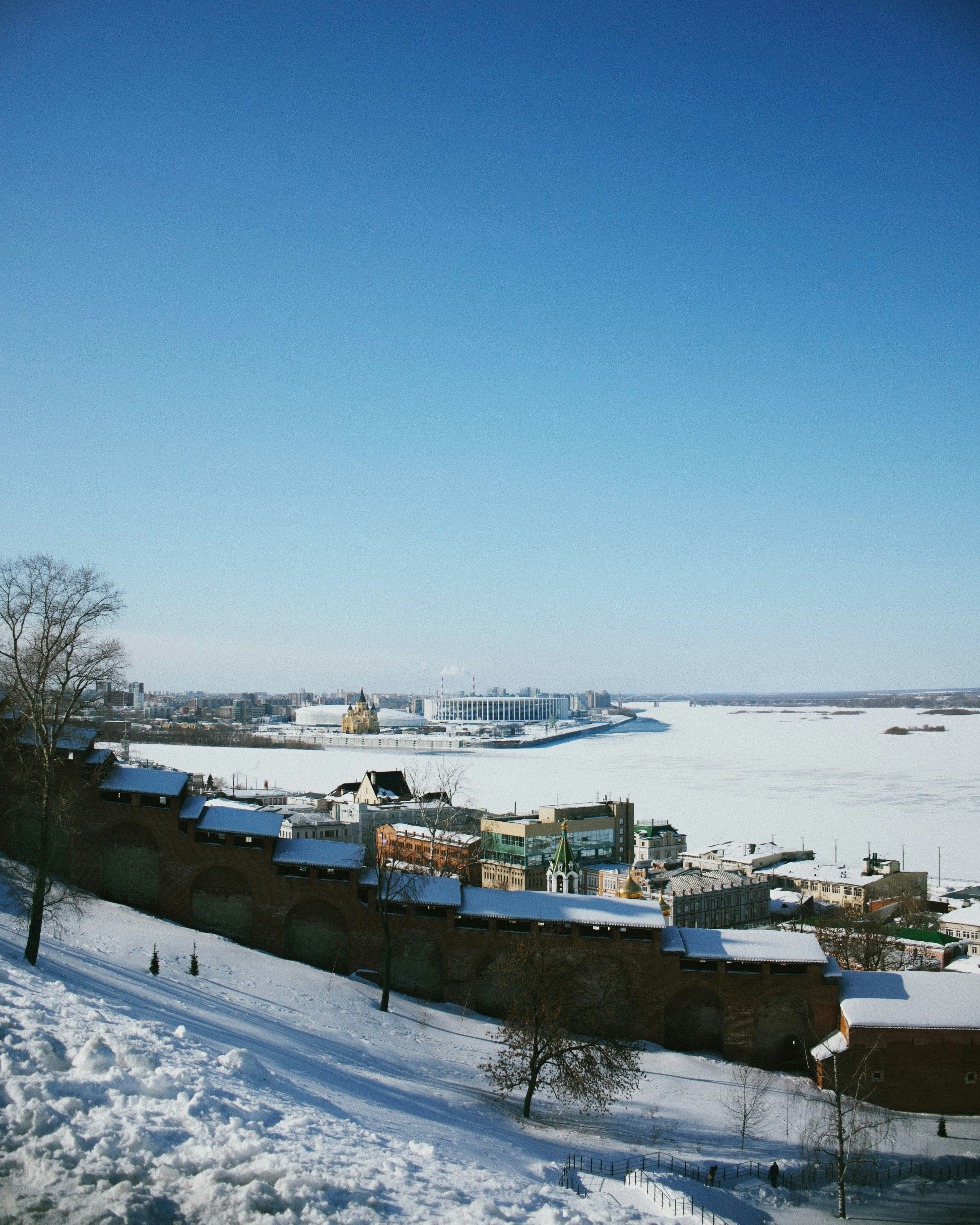 Snowbound Fortress Over the River Horizon