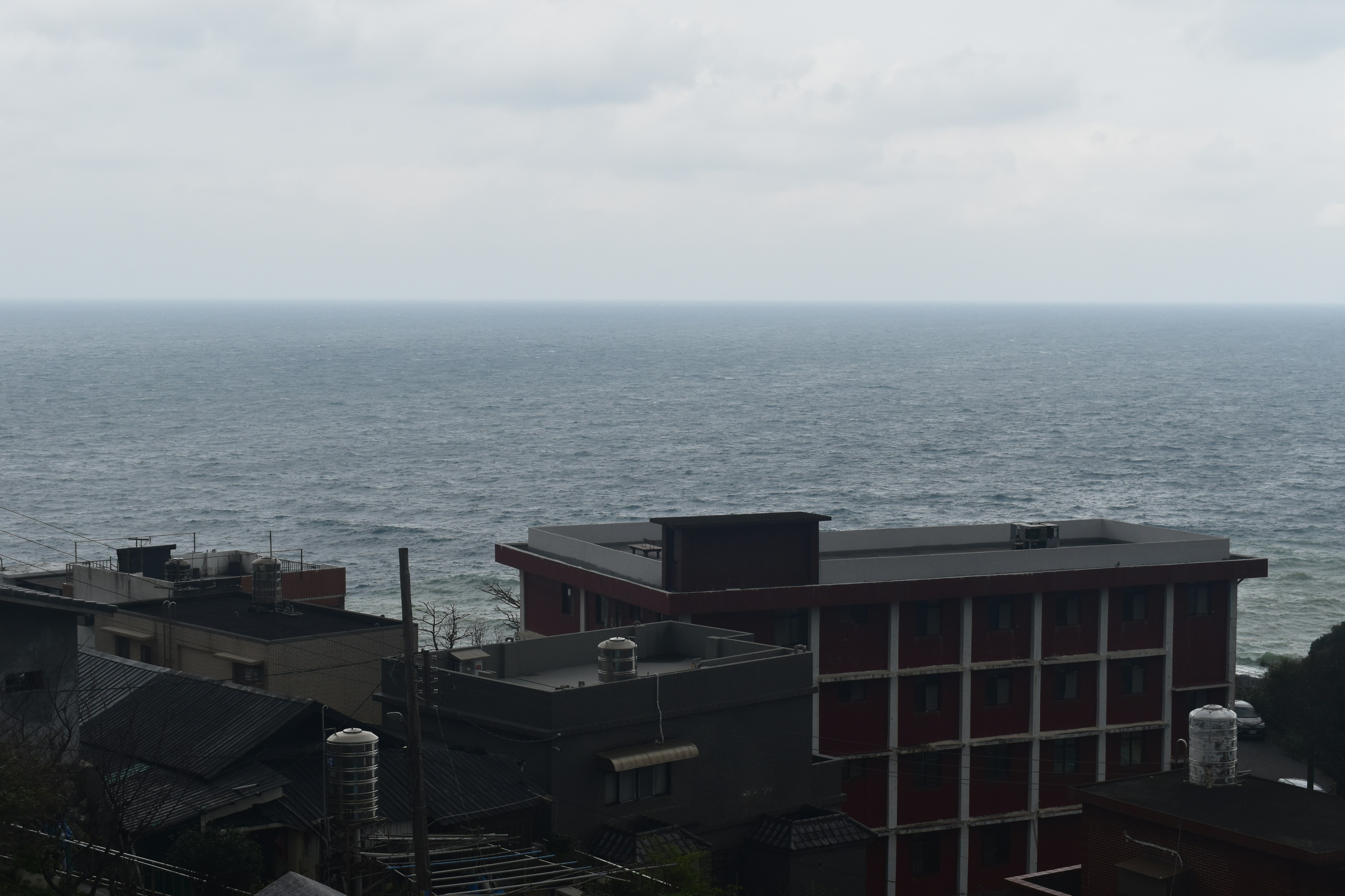 Coastal Horizon Over a City Terrace