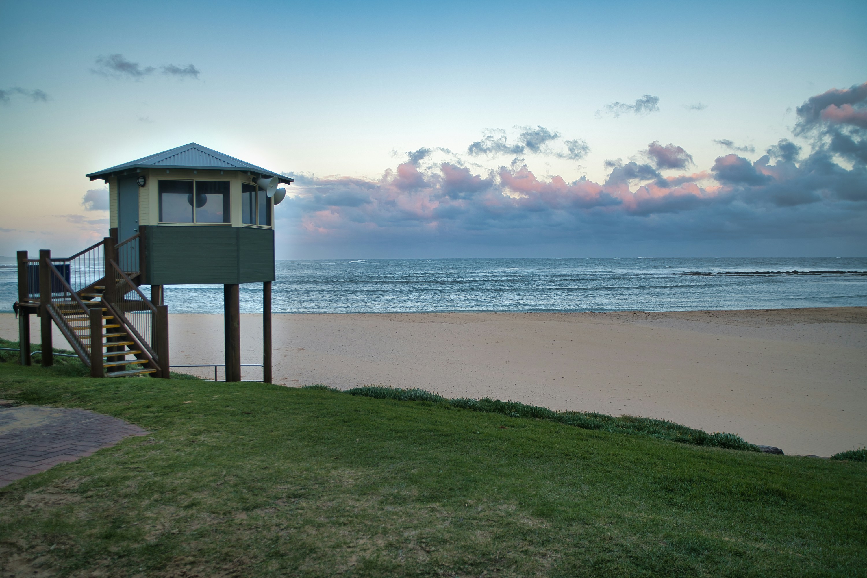 Lifeguard tower watching the sea at dusk