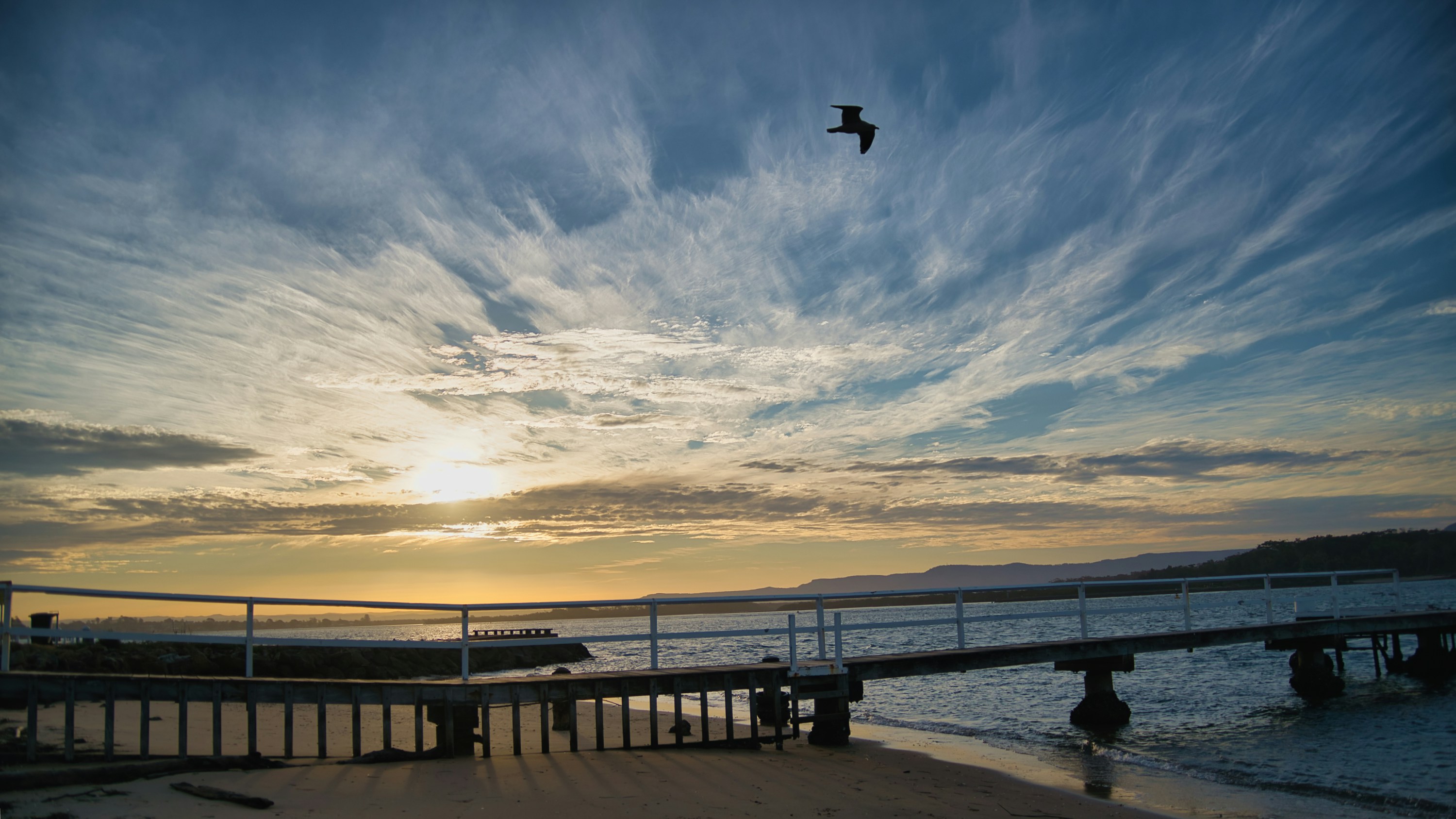 Sunlit Pier Drift: A Seascape in Quiet Balance
