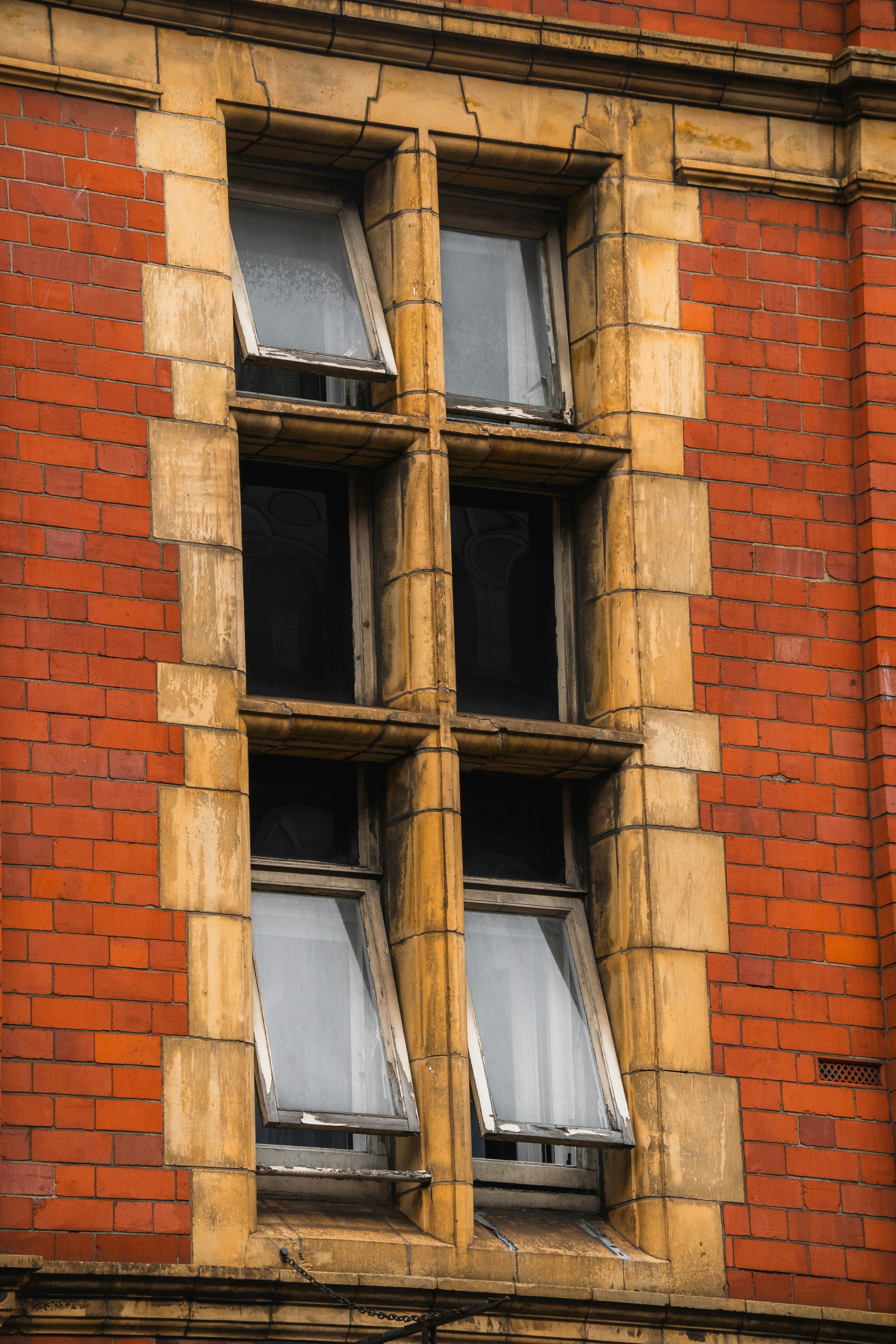 Red Brick Facade with Vertical Window Quads