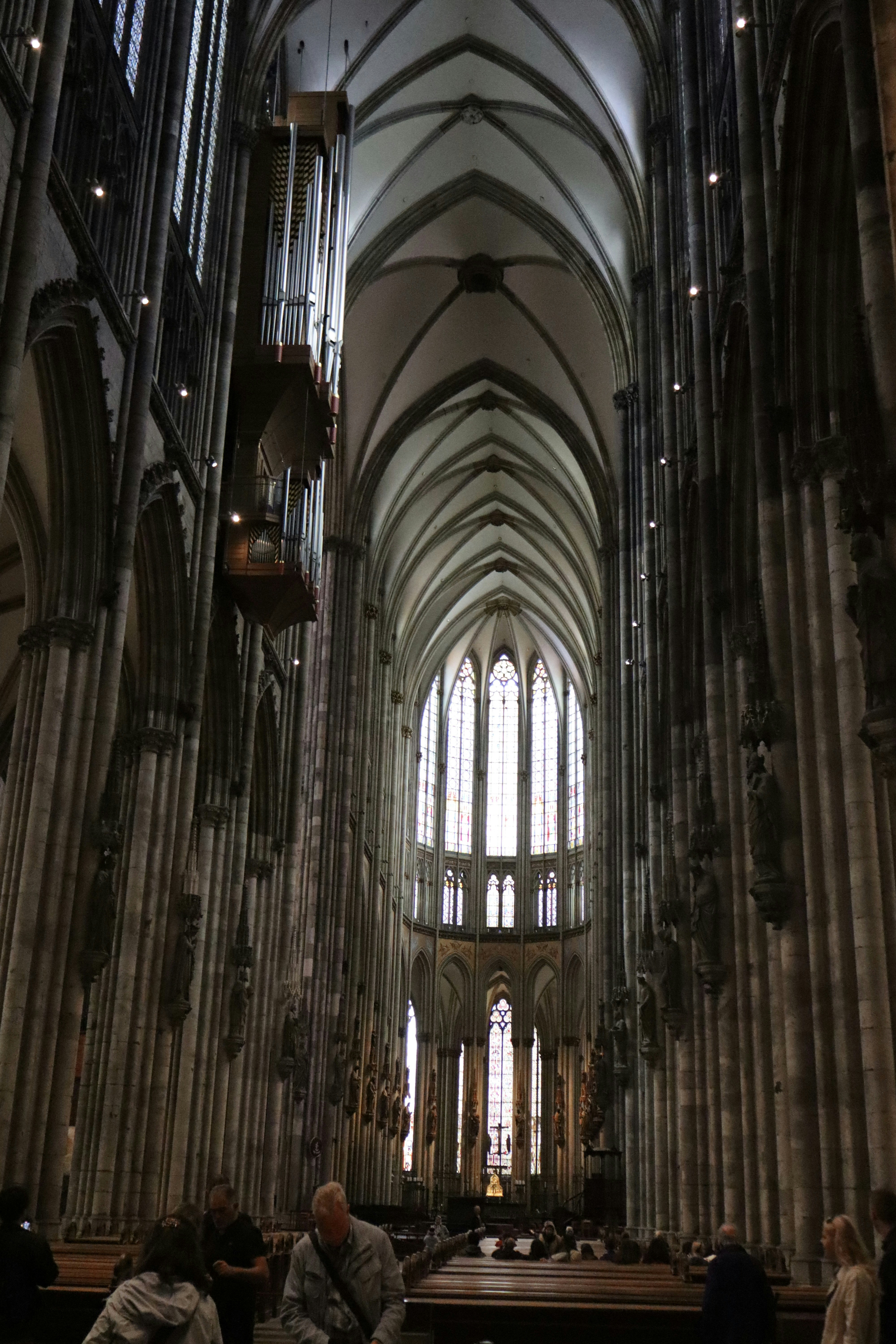 Cathedral Aisle: Light threading the Gothic Vaults toward the Altar