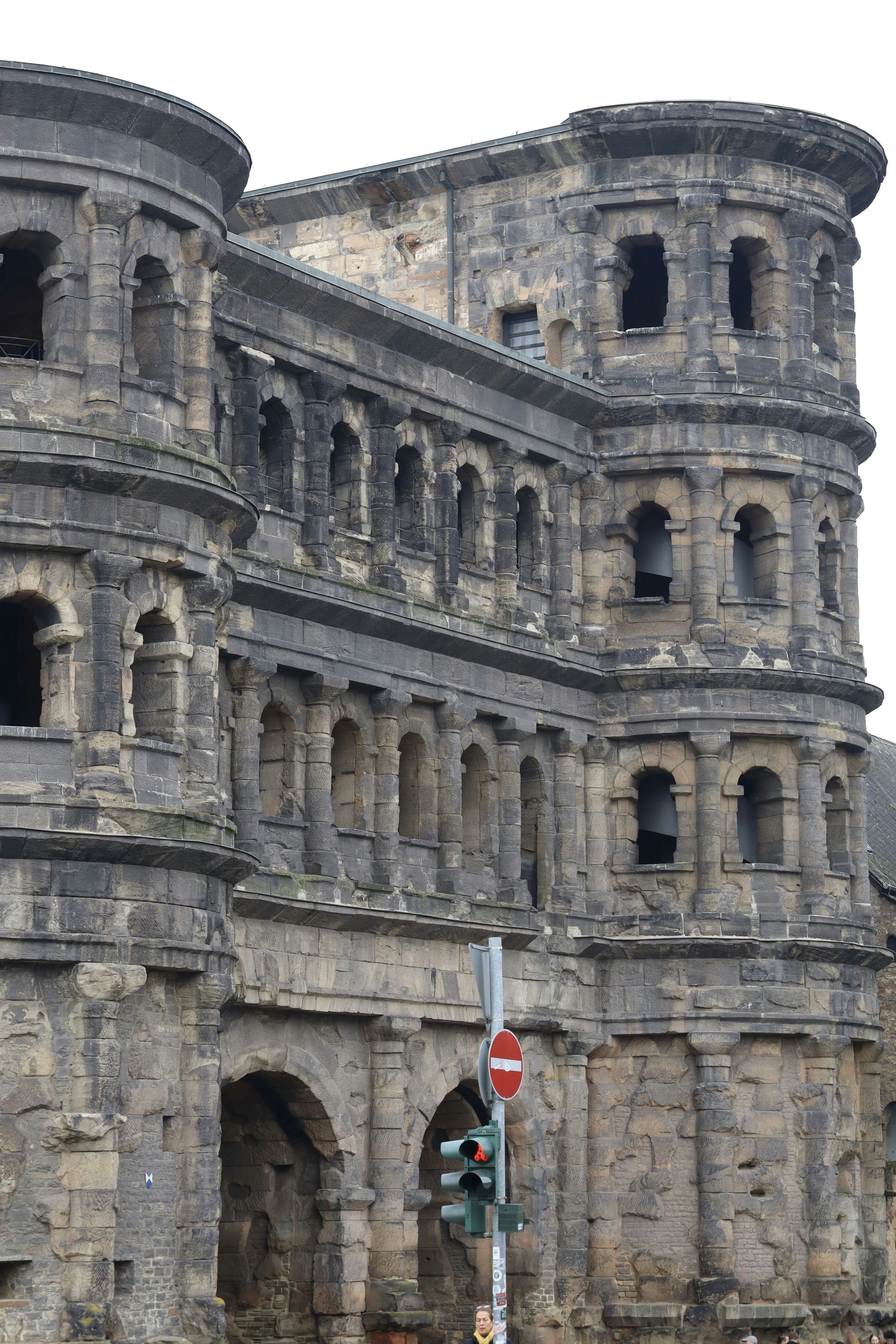 Stone Fortress Corner: Arches and Time-worn Windows