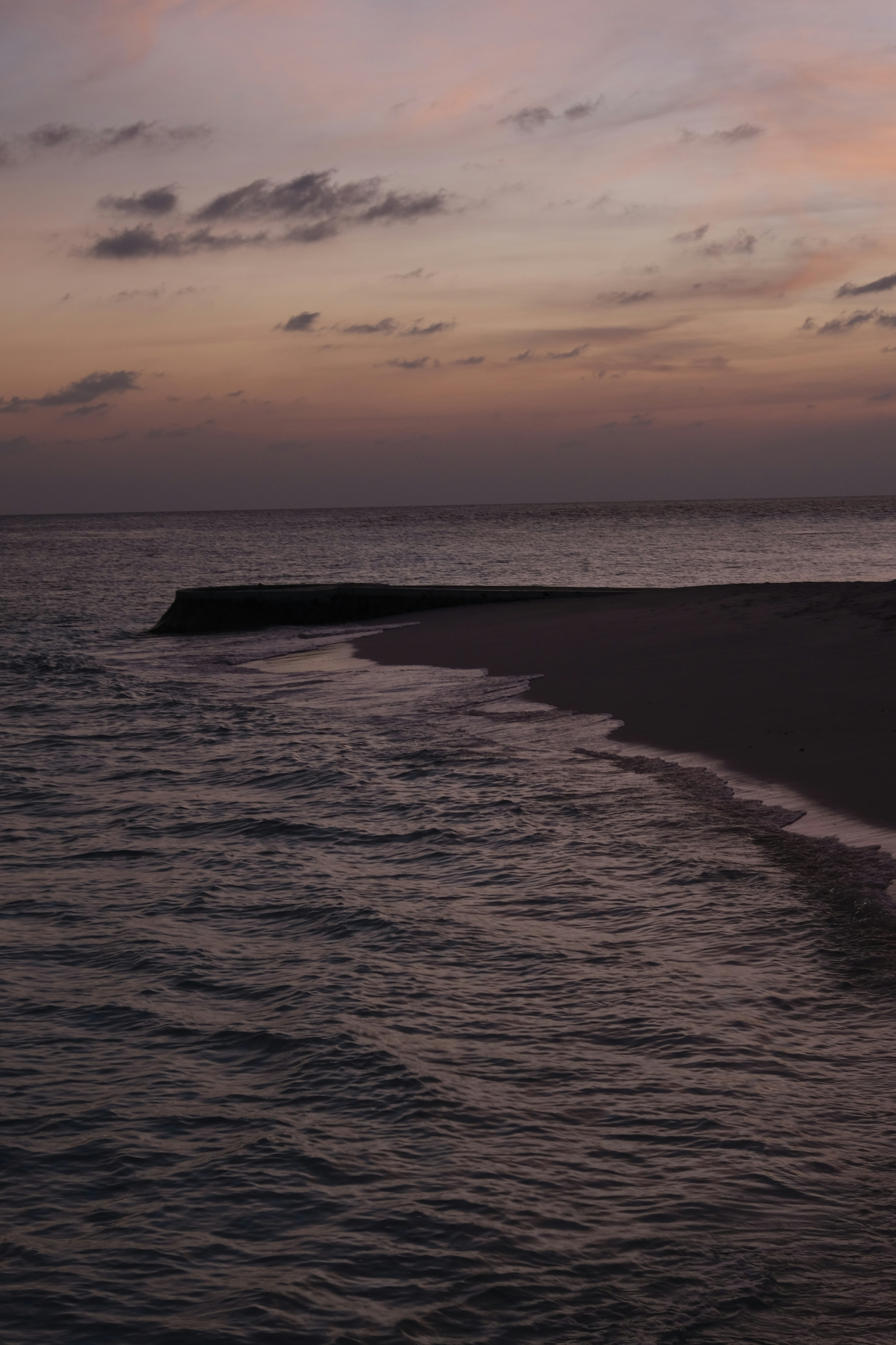 Horizon Quiet: Sunset Curves Along the Sea Wall