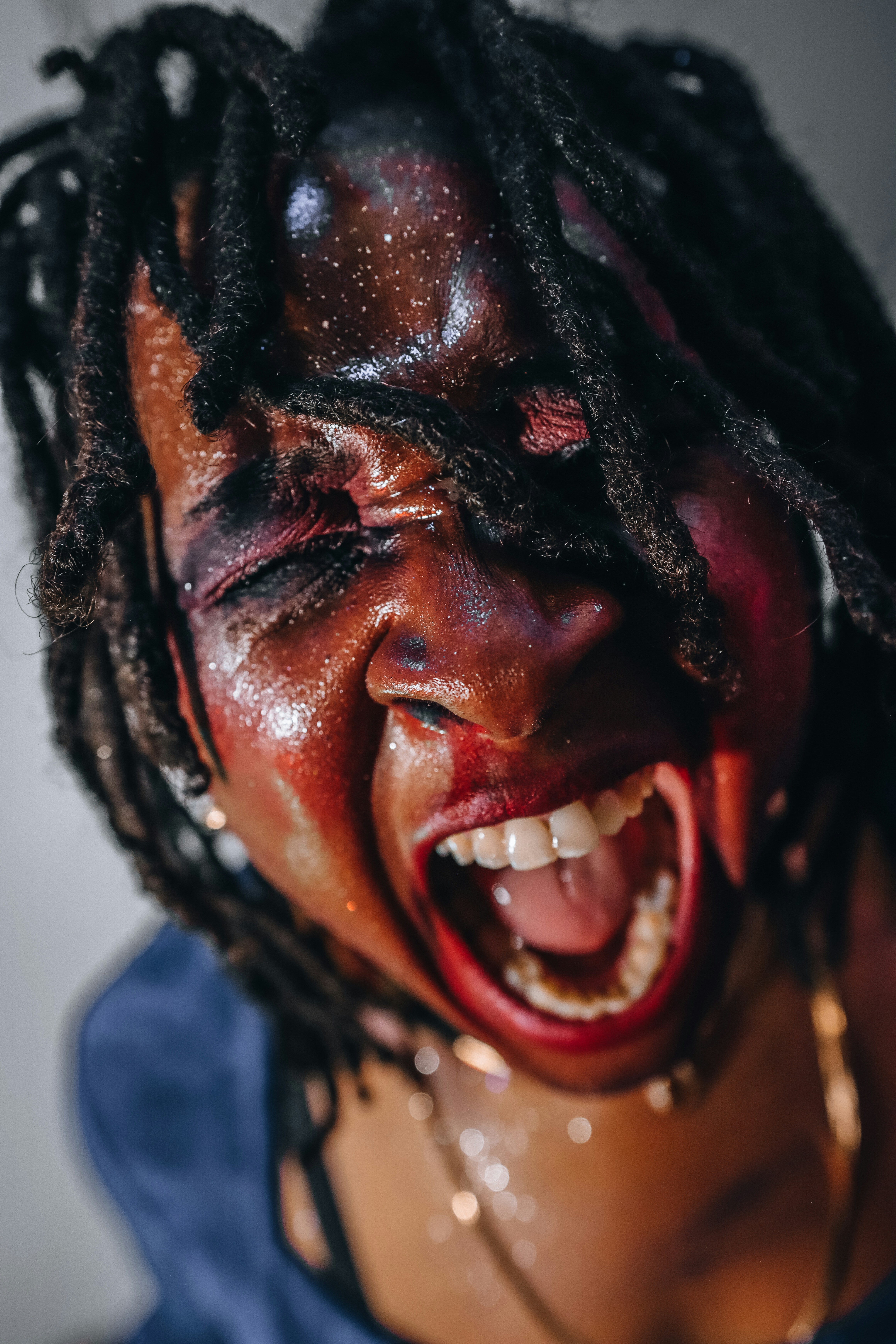 Crescendo of Expression: A Ferocious Shout Captured in Flesh and Color