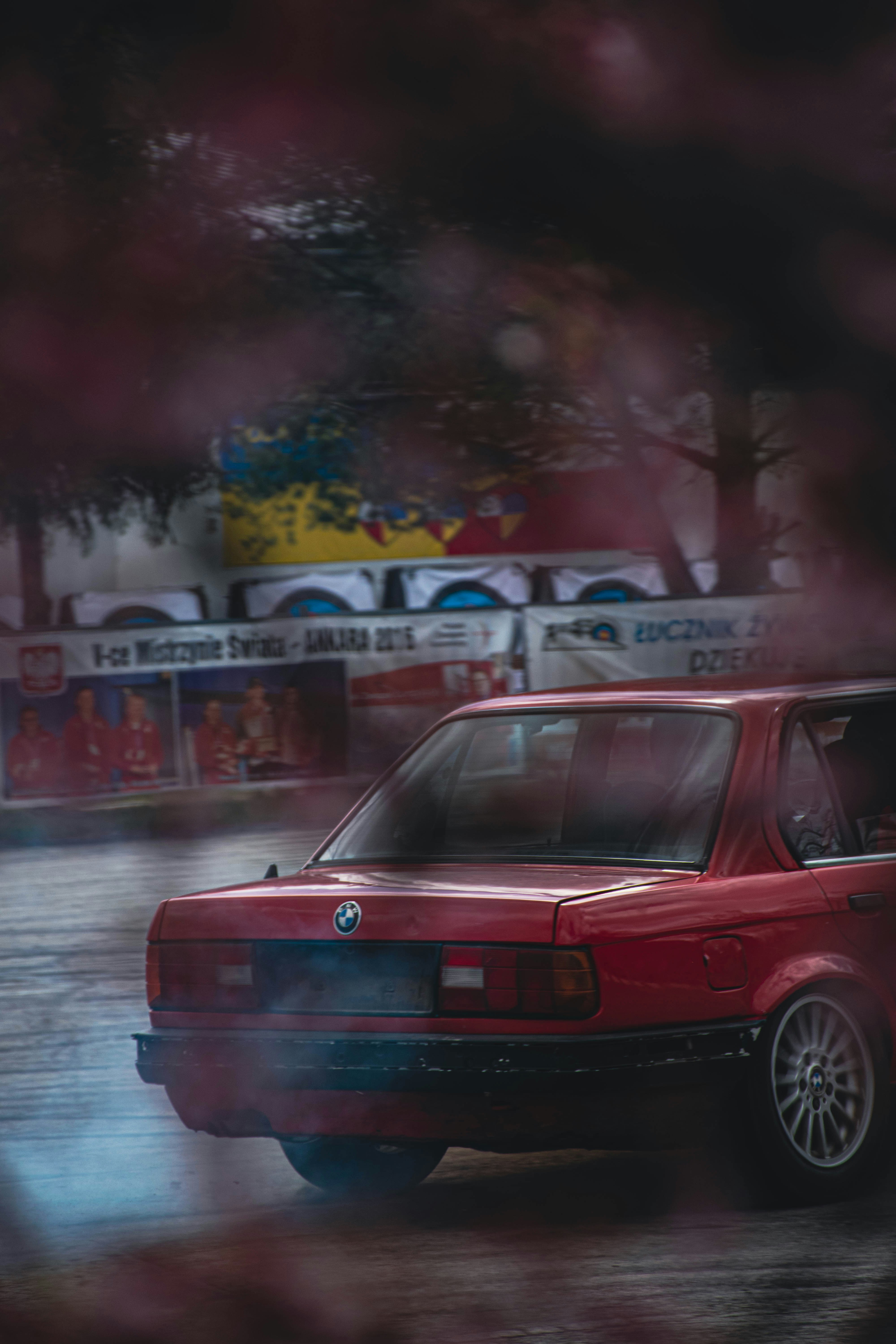 Red BMW Drift: Blurred Night of Rubber and Rain