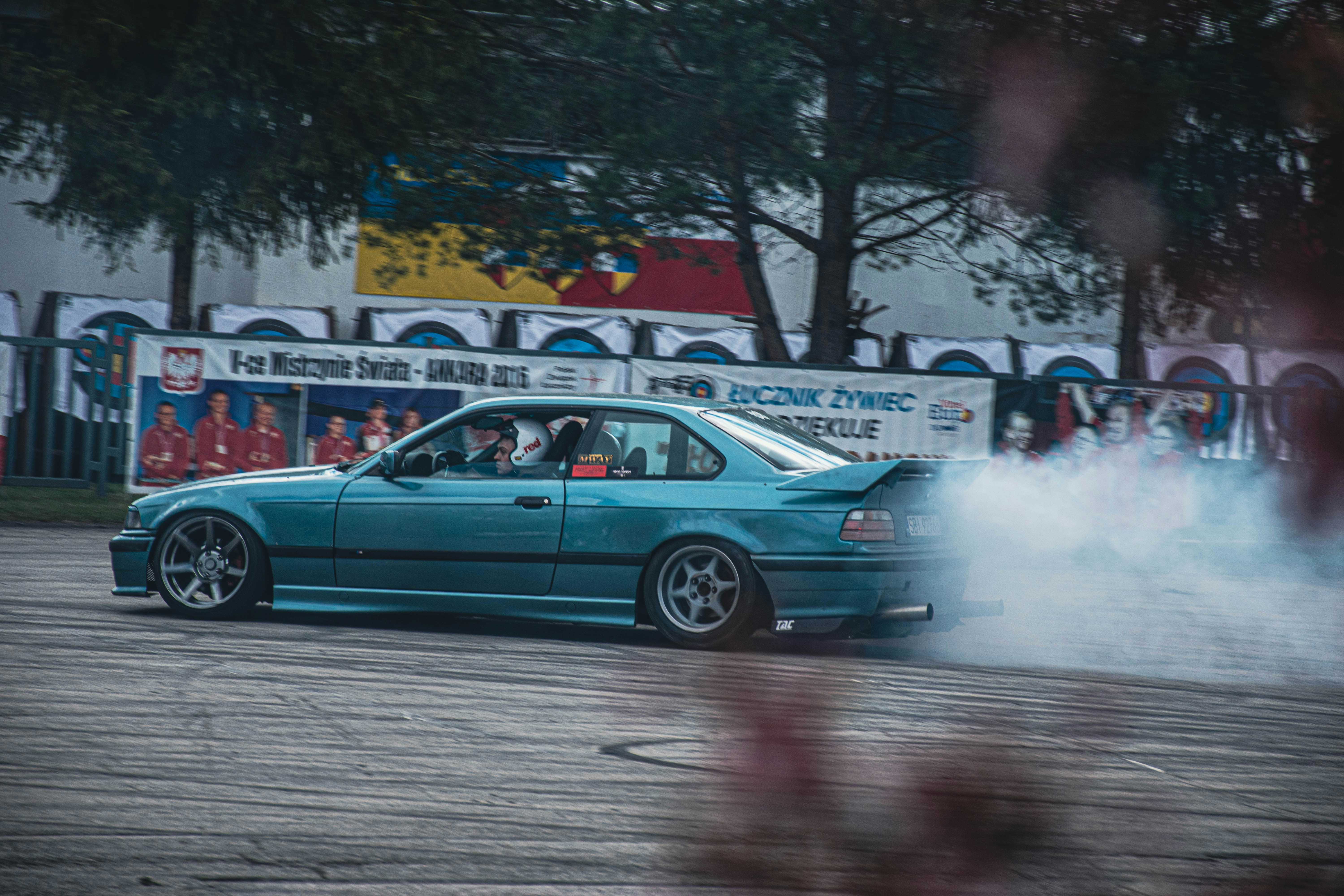  teal drift: smoke and speed by the blue coupe