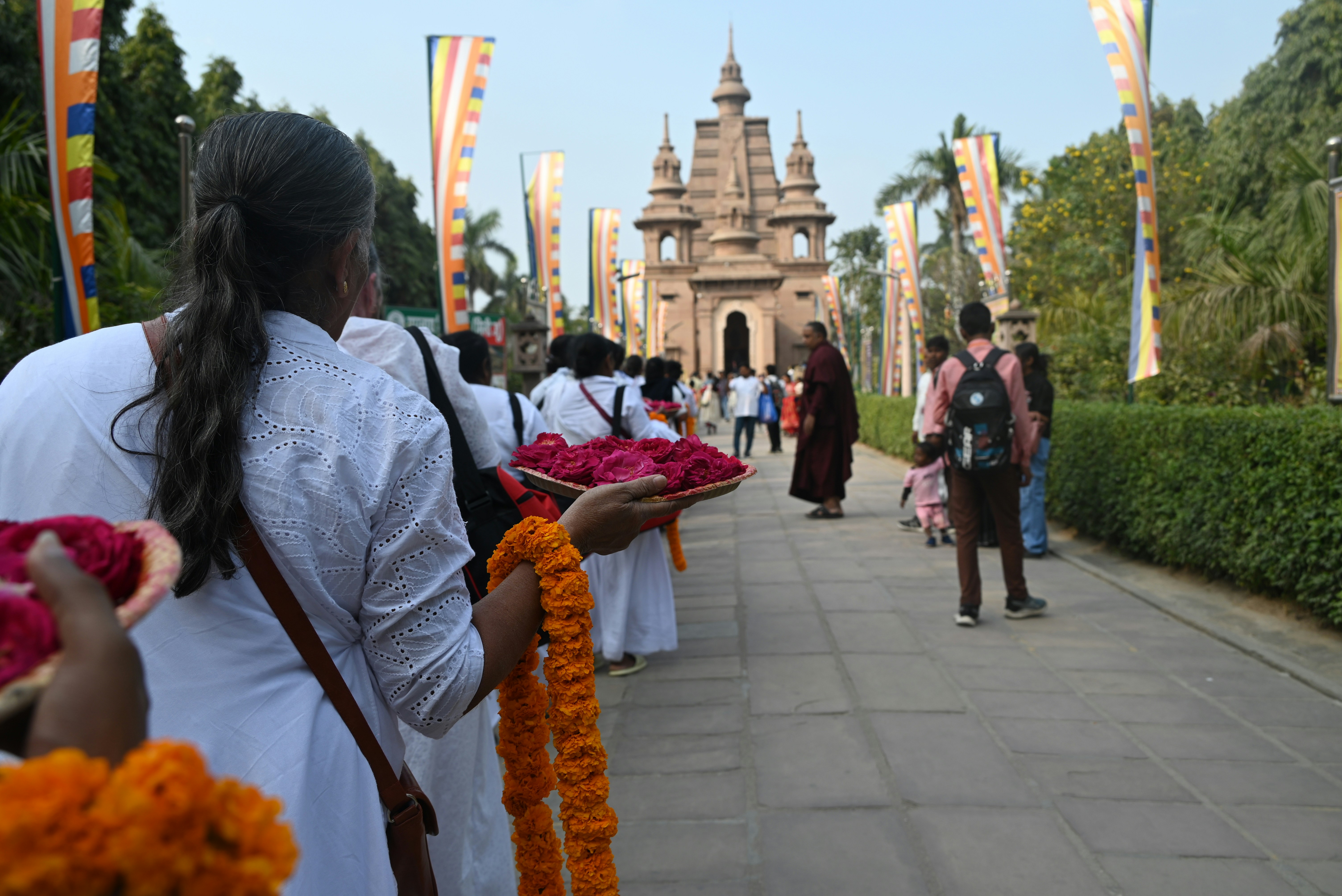 Marigold Courtyard Procession Toward a Castle-like Shrine