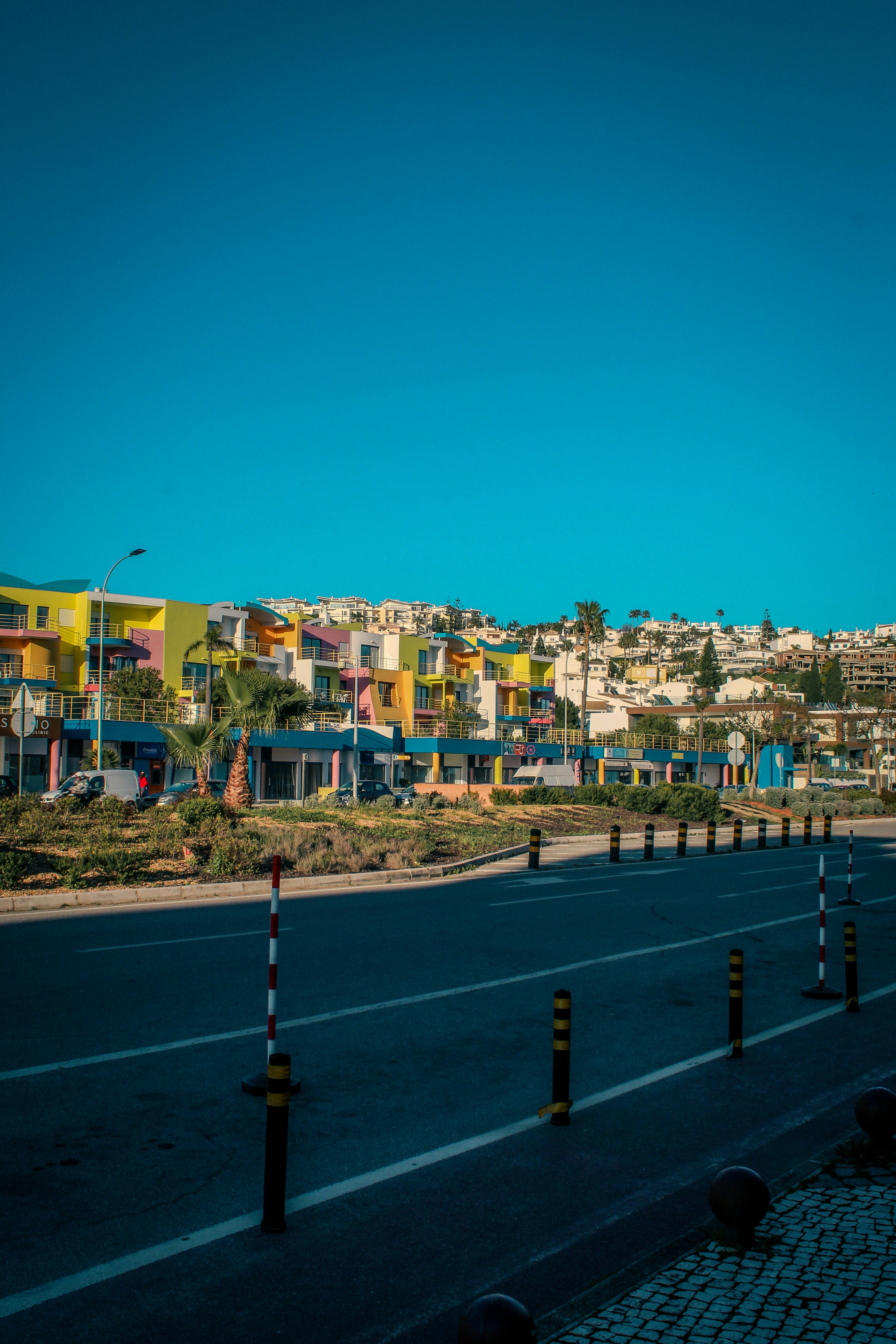 Colorful seaside boulevard under a crisp coastal sky