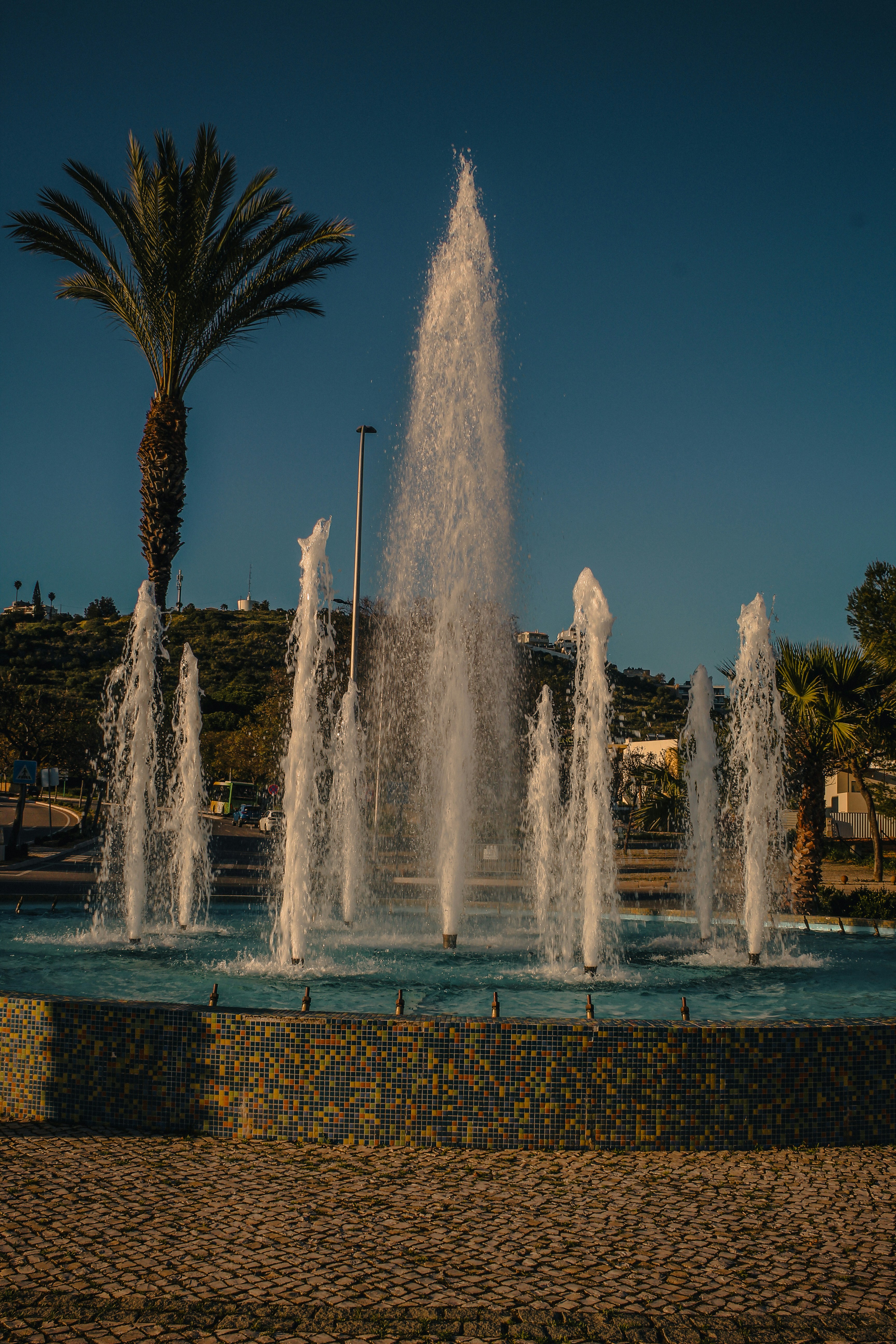 Central Fountain Symphony under a Clear Coastal Sky