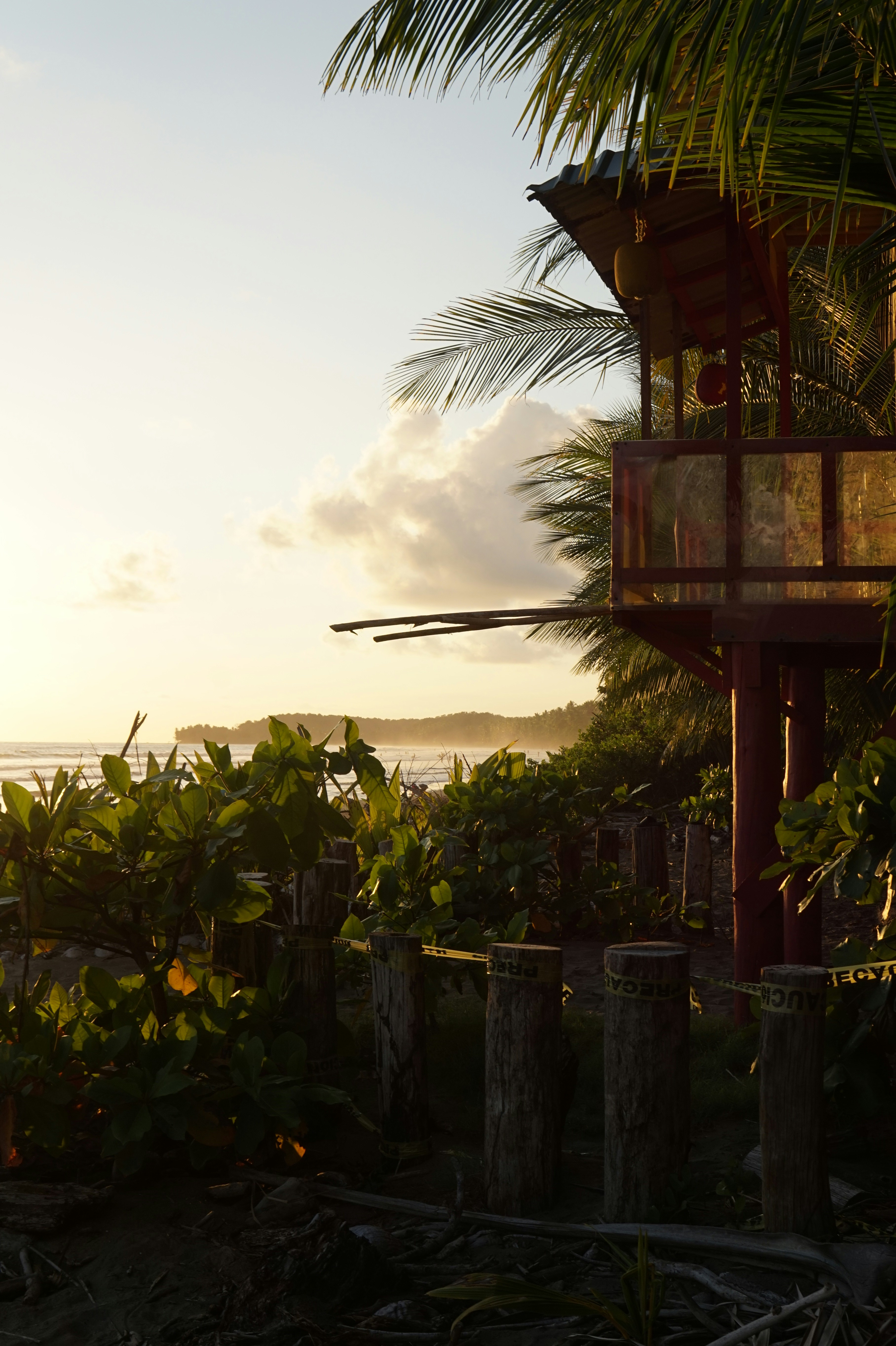 Sunset Overboard Haven: A Tropical Lifeguard Tower at Dusk