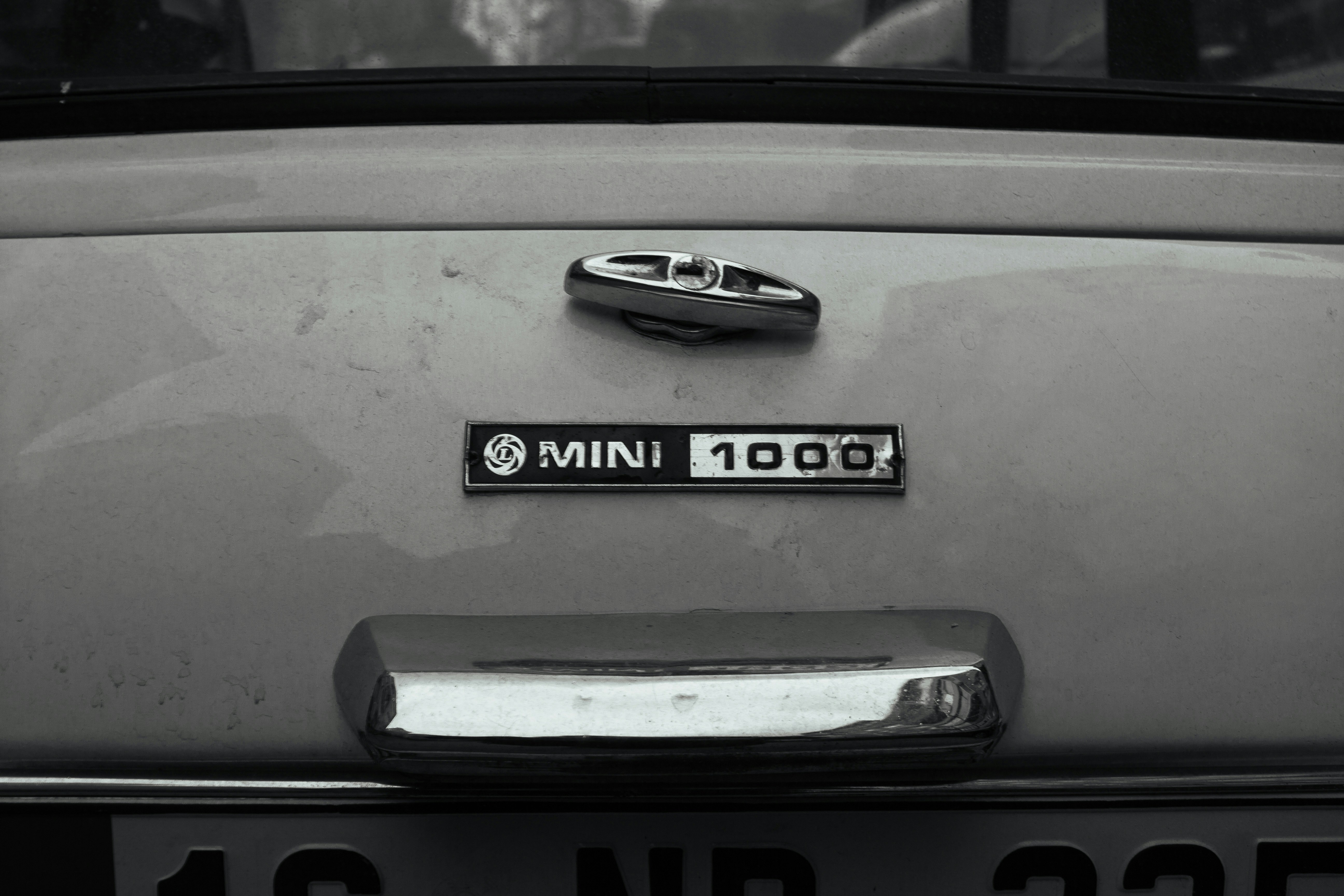 Back-of-Badge Quietude: A Dusty Mini with Classic Emblem